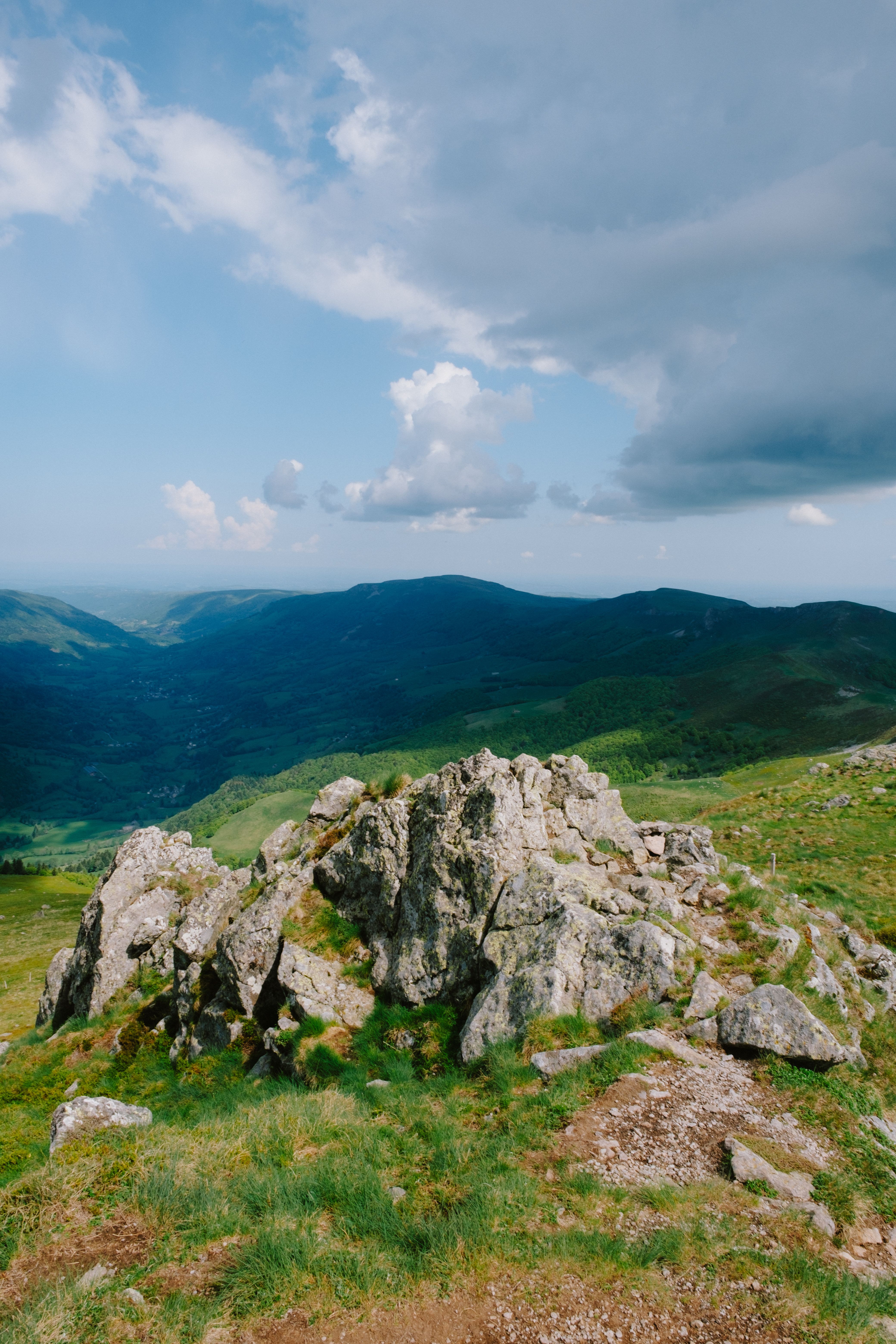 Rocks and Green Hills behind · Free Stock Photo