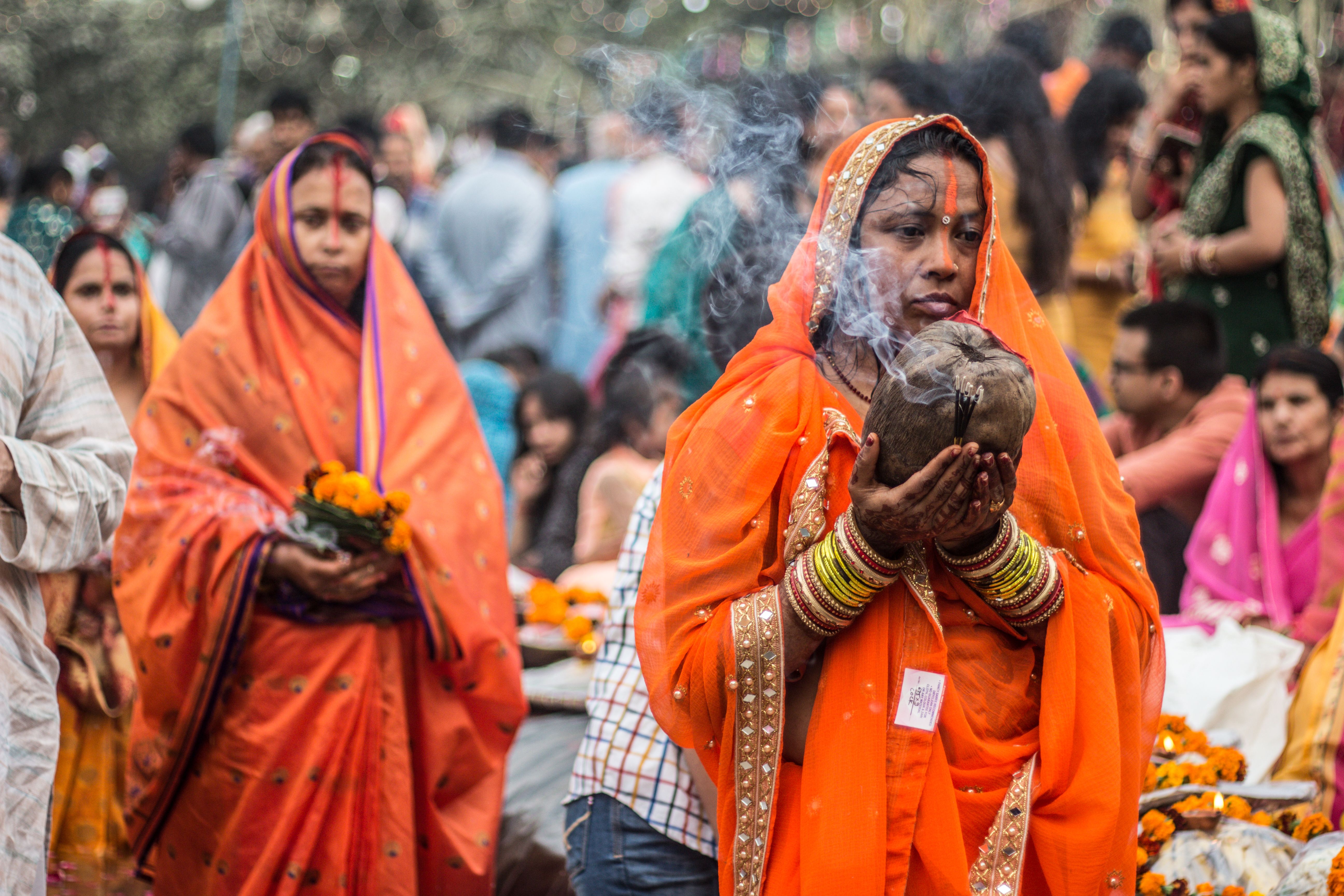 Hindu Women Standing during a Religious Ceremony · Free Stock Photo
