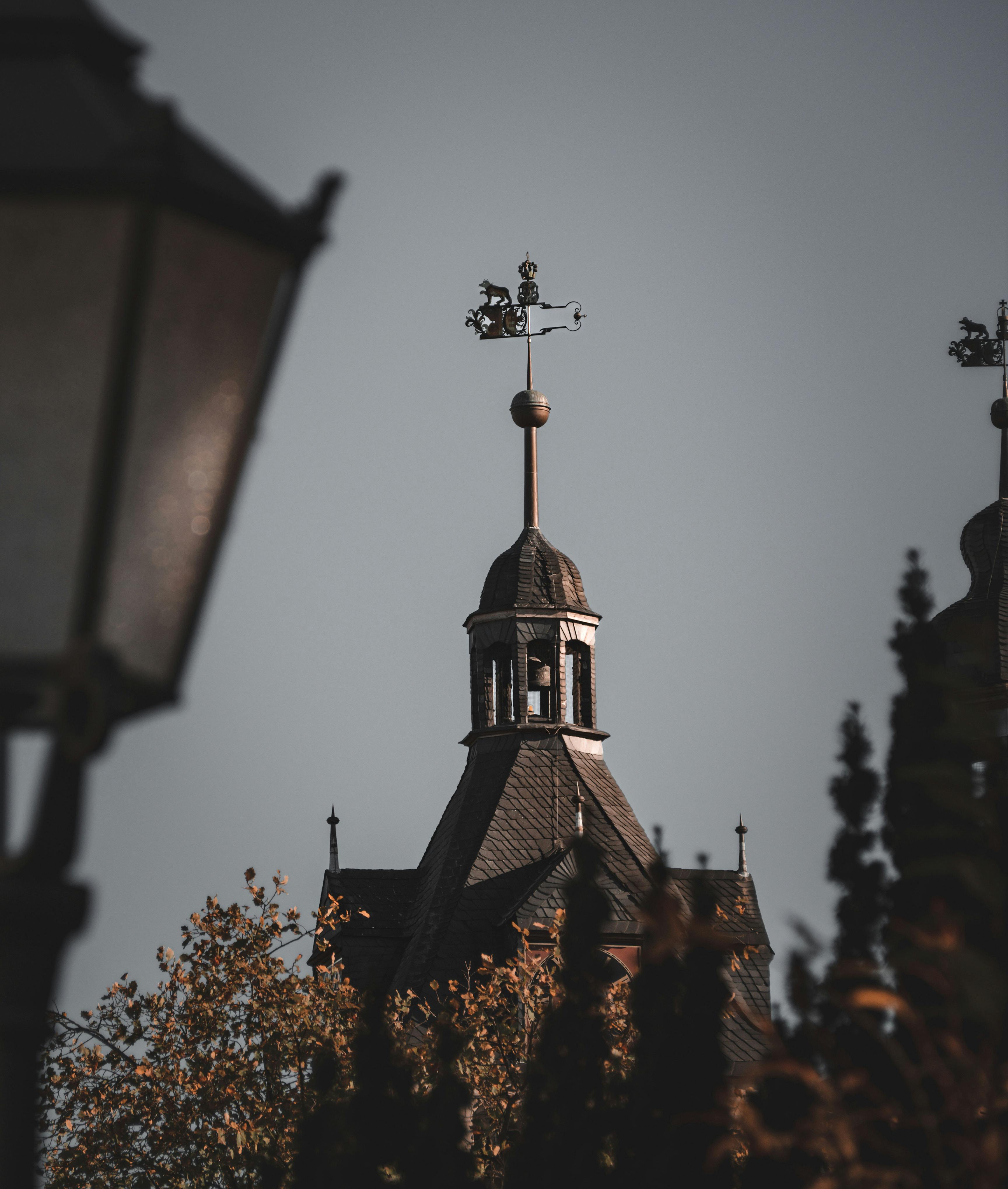 Tower Topped by Weathervane · Free Stock Photo