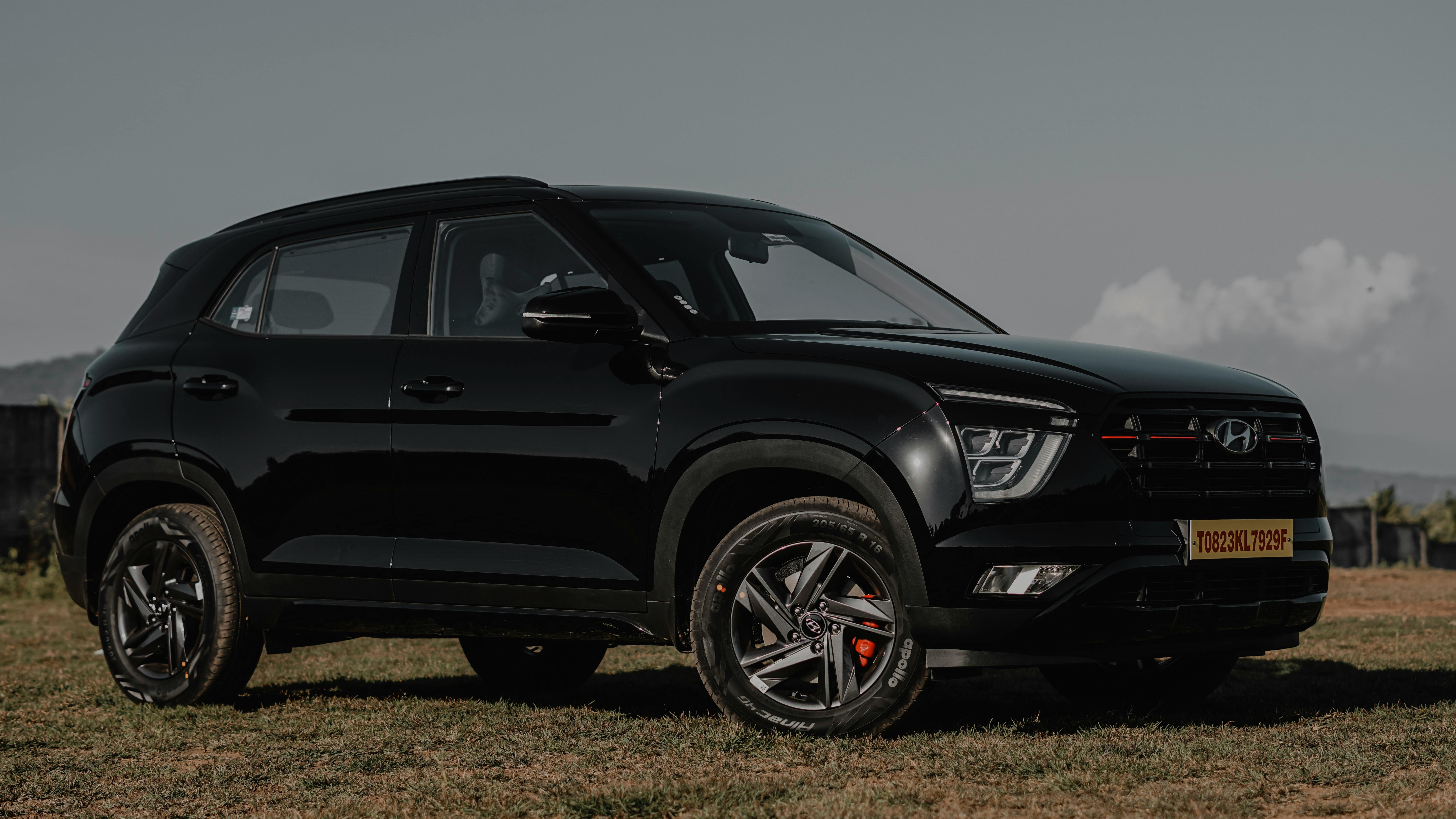 SUV Car Parked in the Field · Free Stock Photo