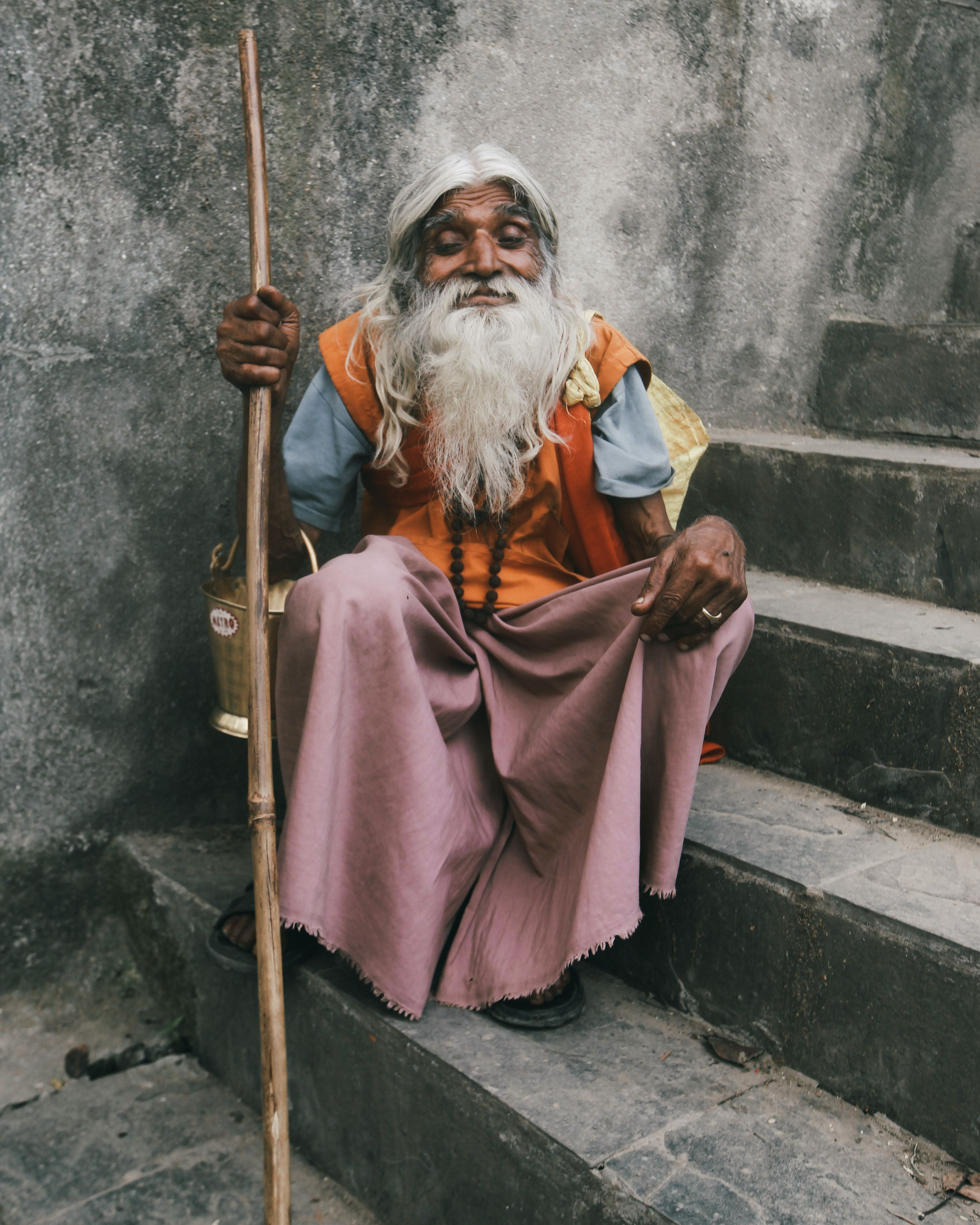 Elderly Monk with a Stick · Free Stock Photo