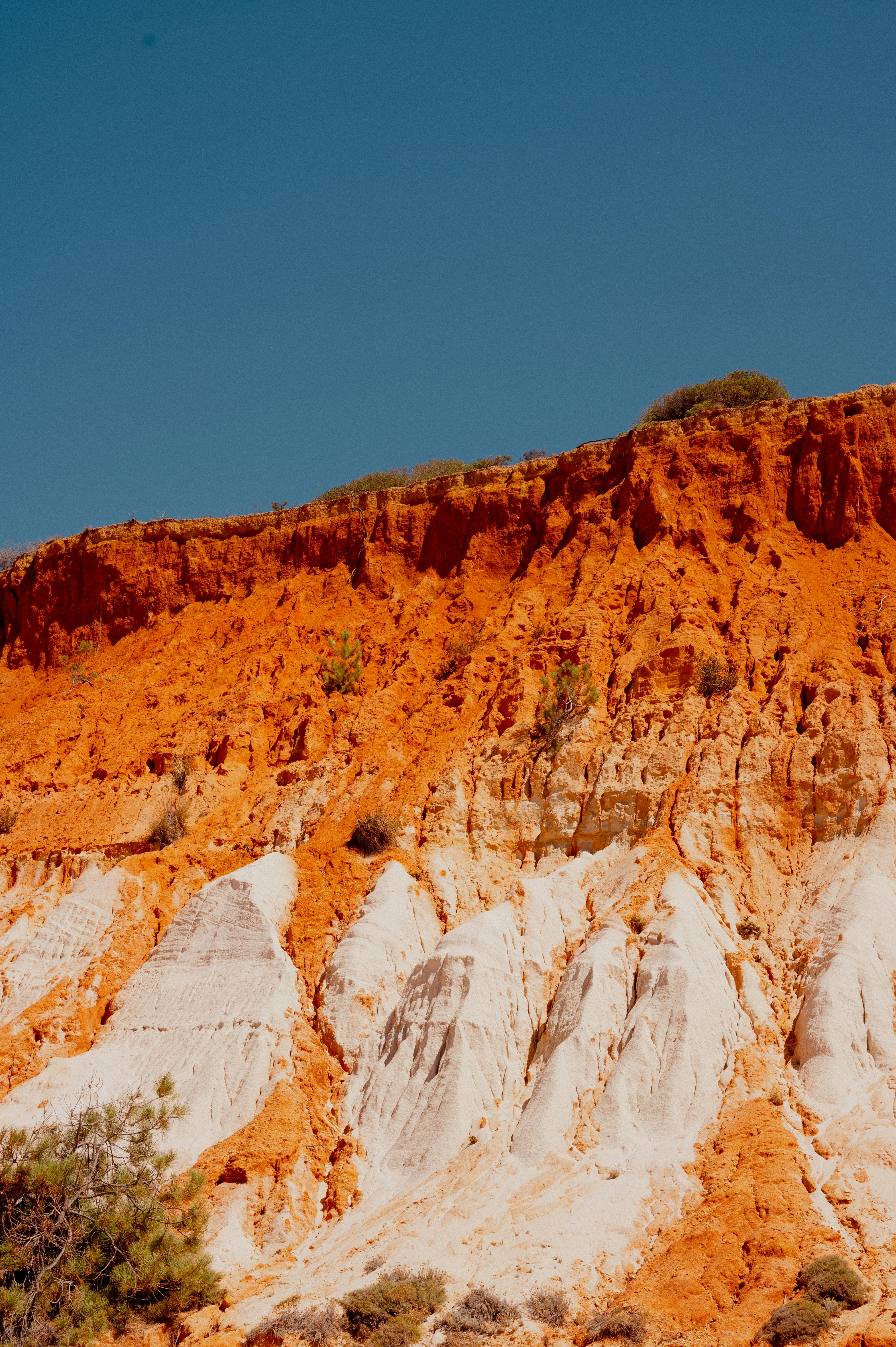 Red Cliff by the Beach · Free Stock Photo