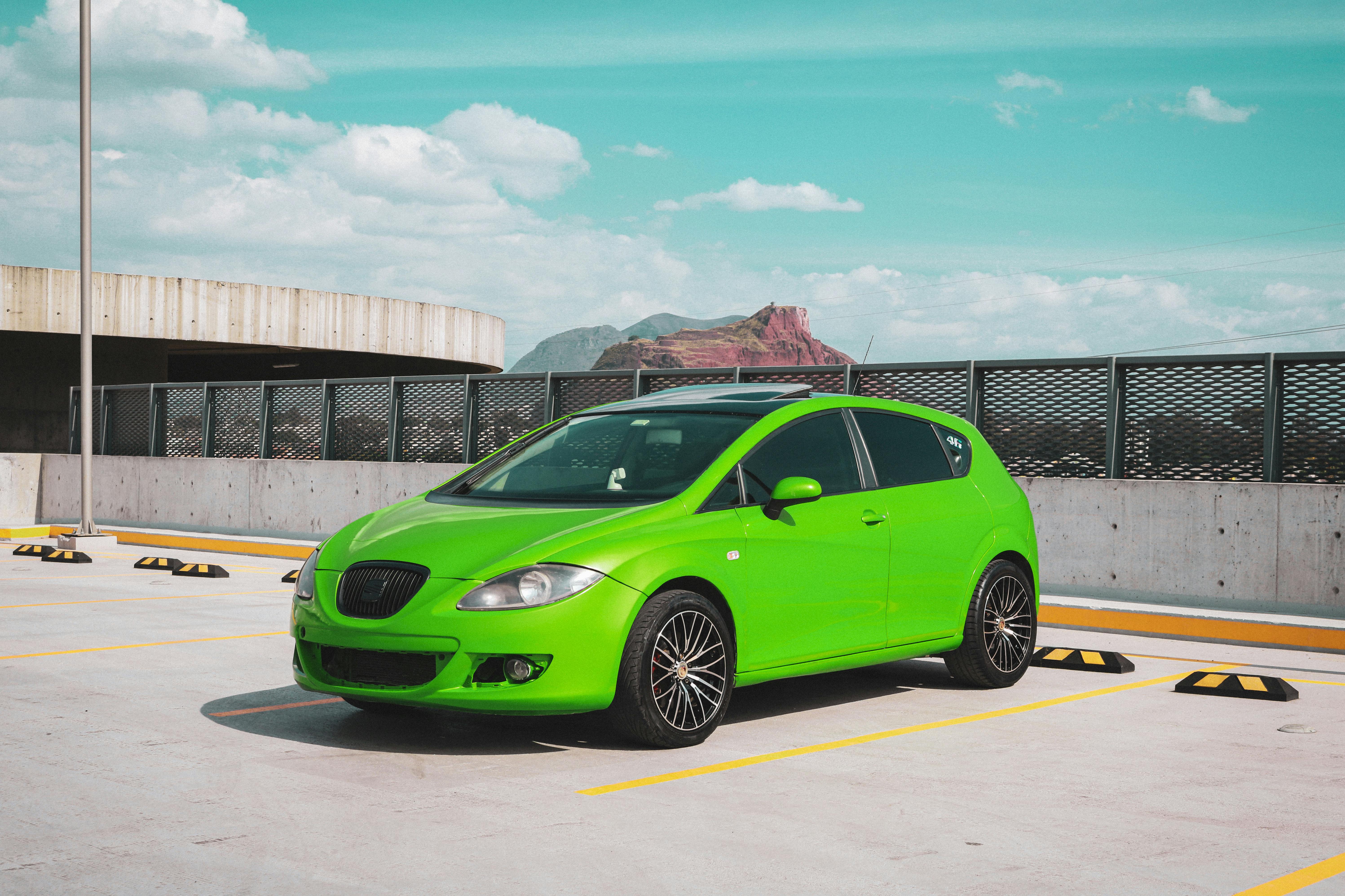 Neon Green Seat Leon Mk2 with Sunroof in the Parking Lot · Free Stock Photo