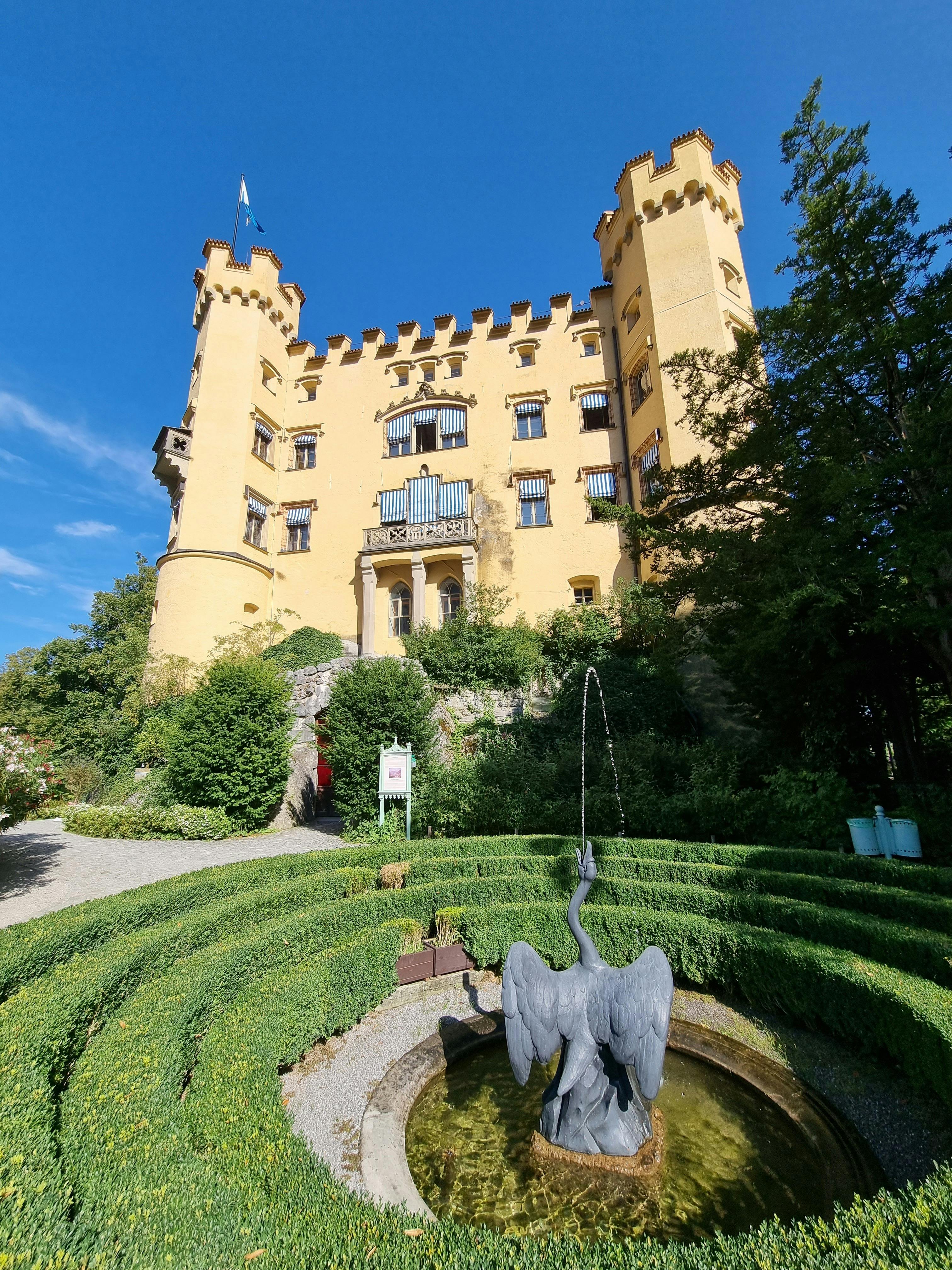 White Concrete Castle Surrounded by Green Plants · Free Stock Photo