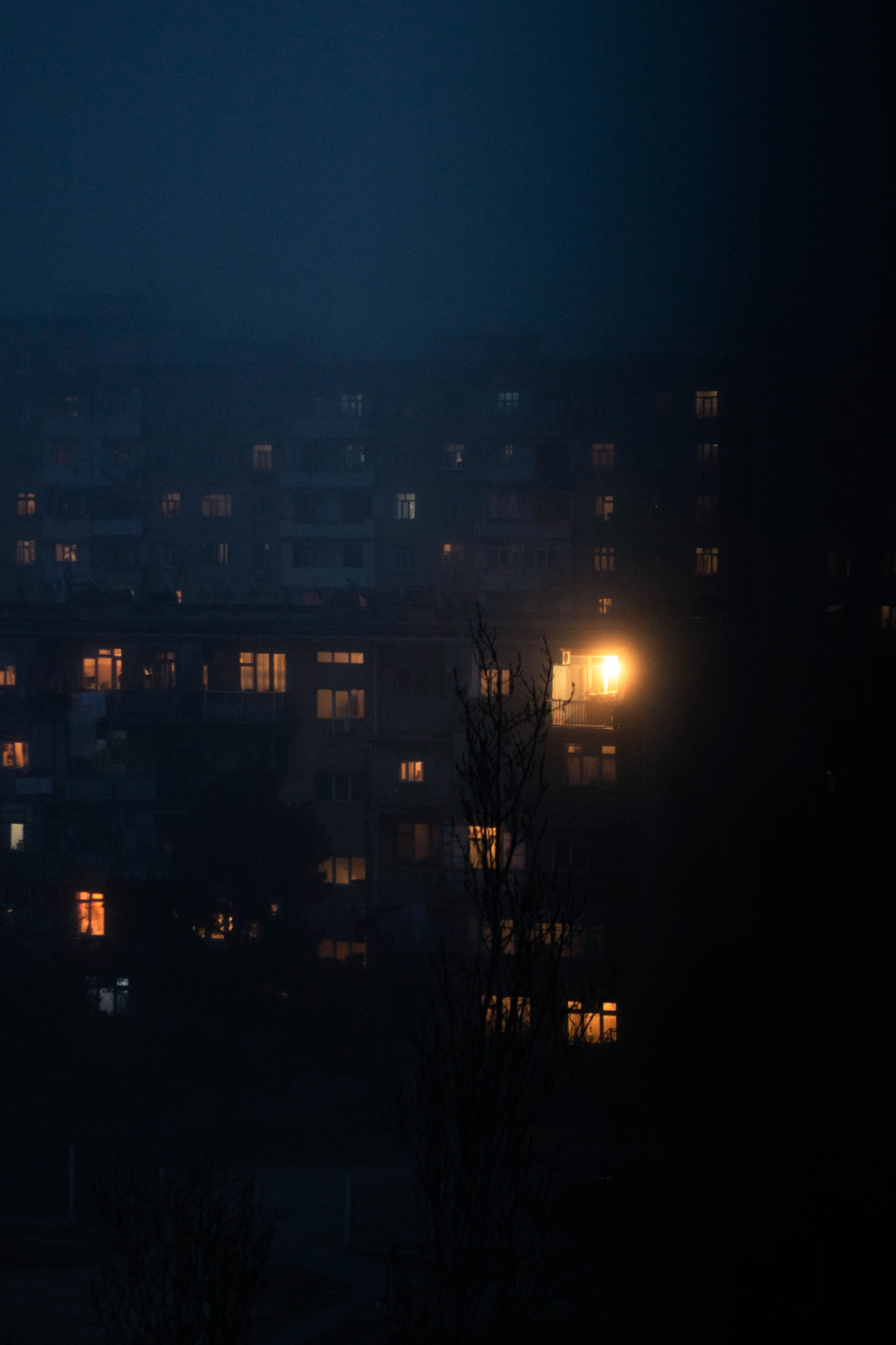 Illuminated Windows at Dusk · Free Stock Photo