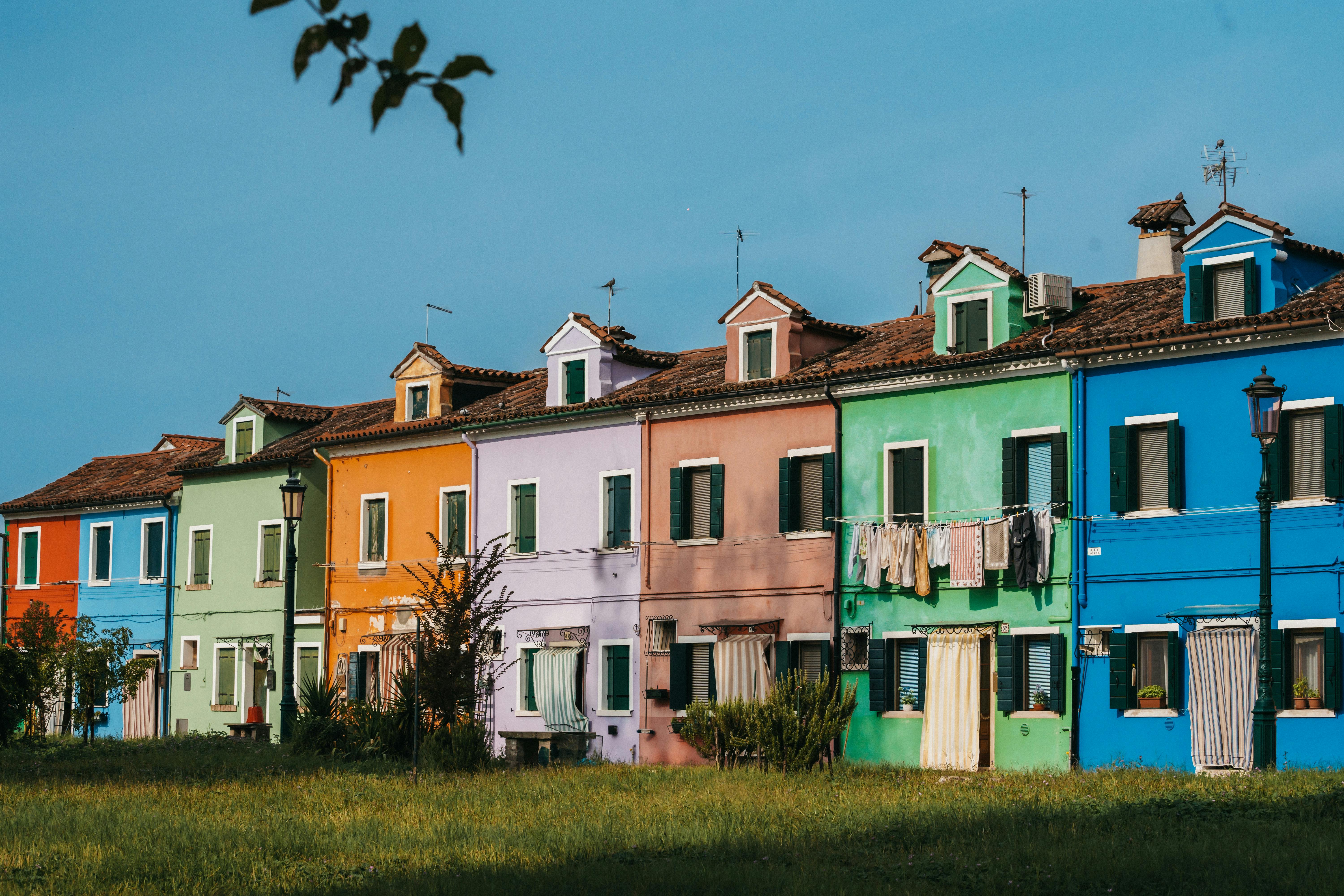 Multi Colored Facade of Townhouses · Free Stock Photo