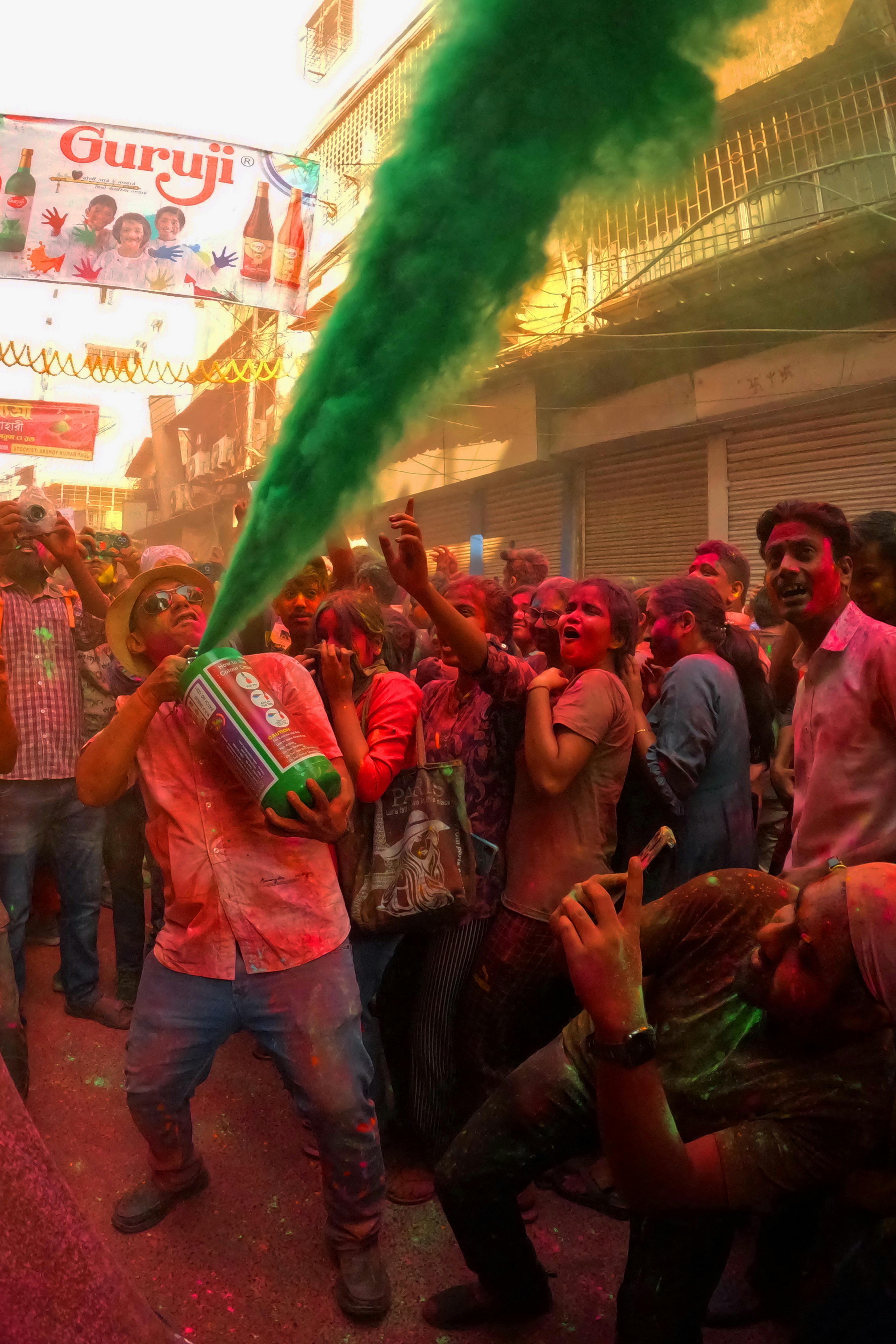 Crowd Throwing Green Powder at Festival · Free Stock Photo