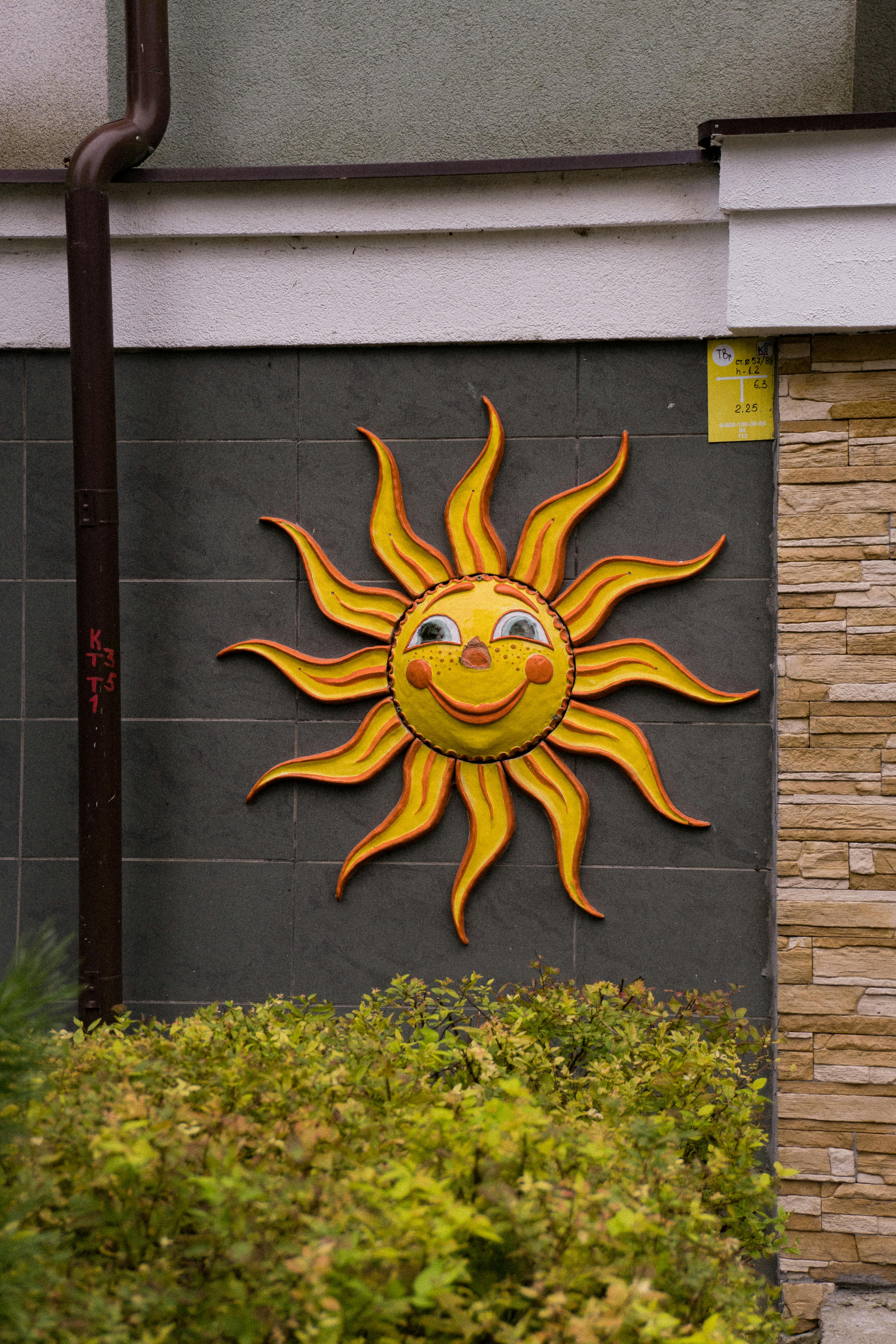 A Sun Decoration on a Wall · Free Stock Photo