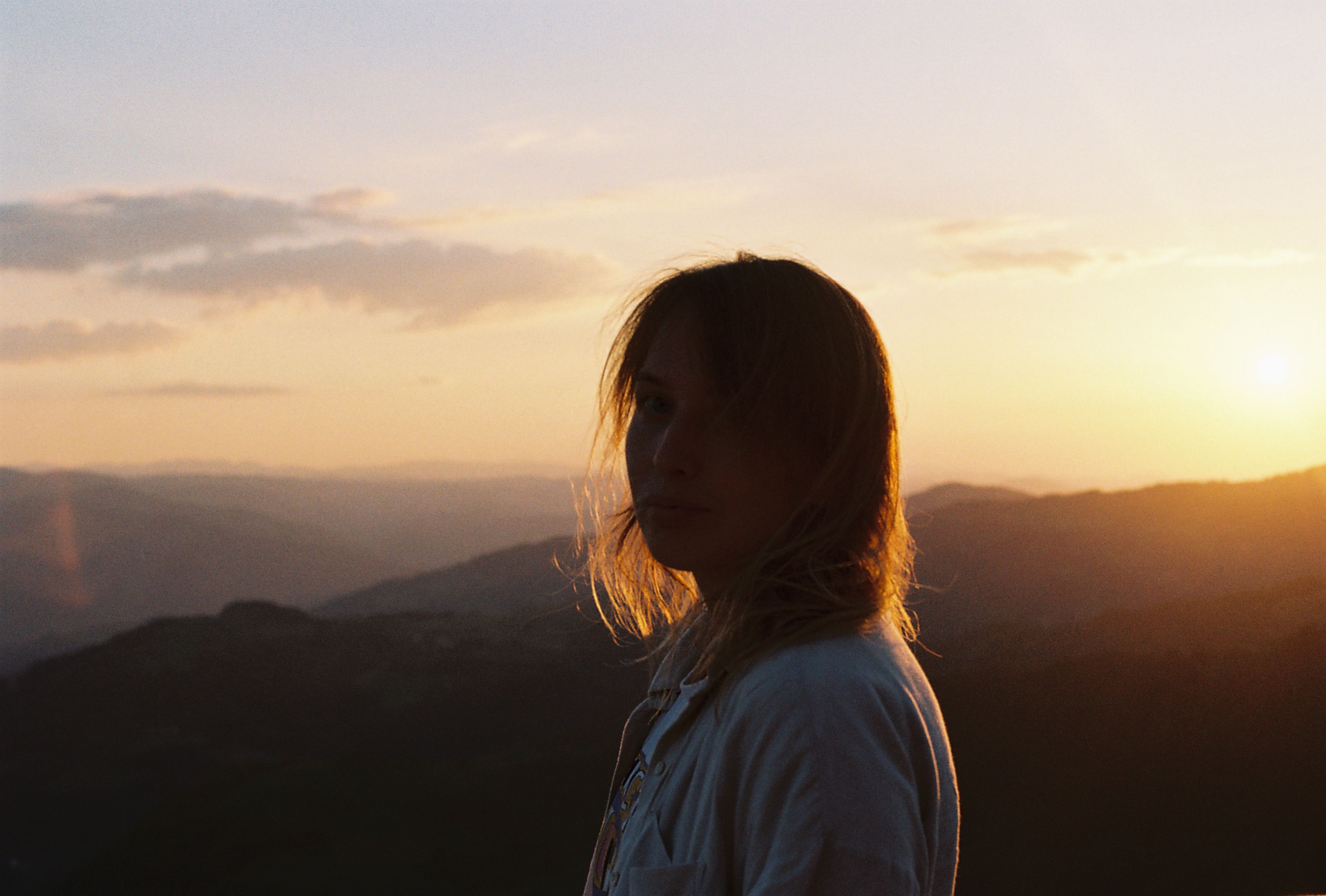 Woman Looking at Sunset · Free Stock Photo