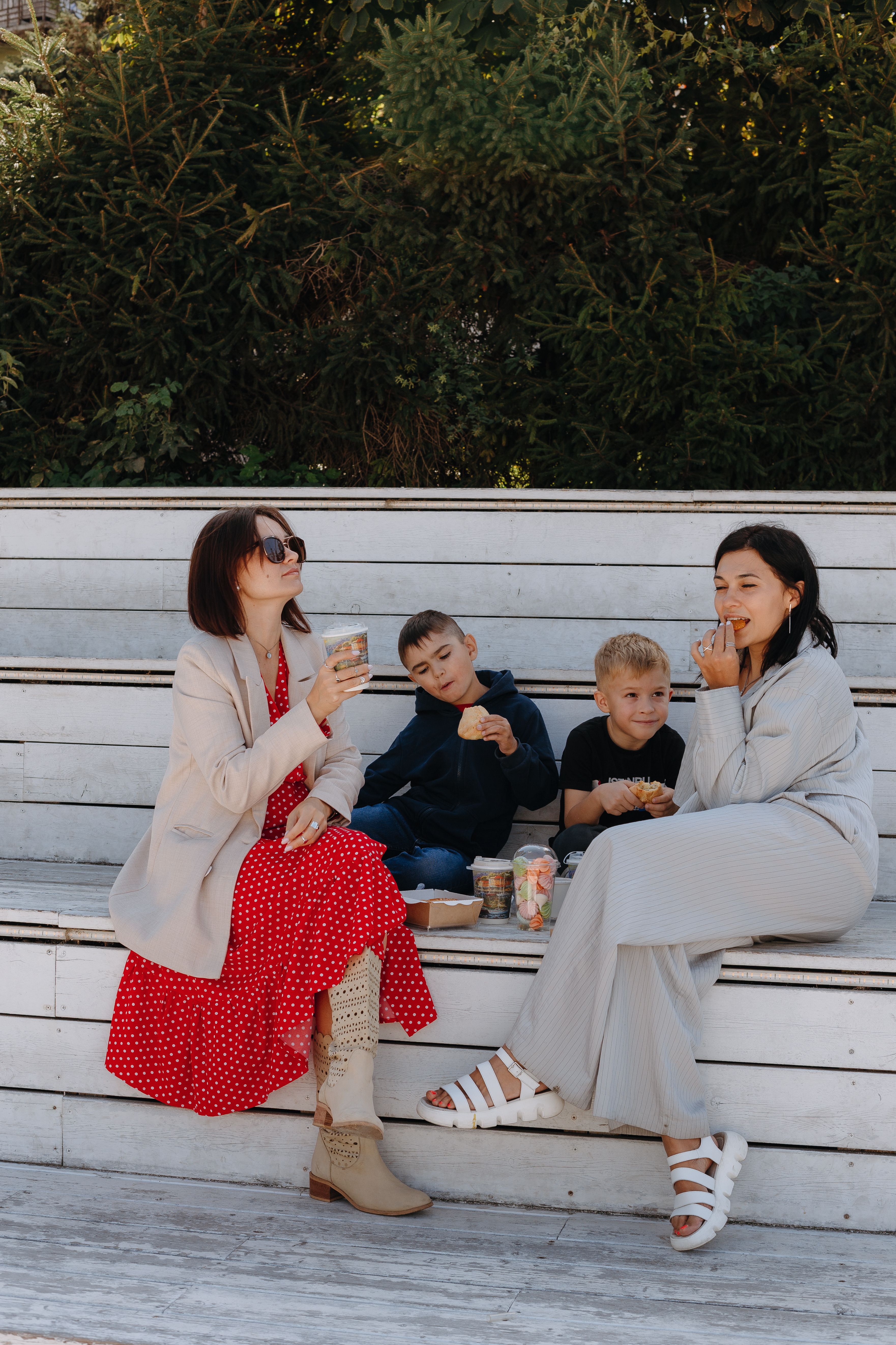 Two Women with Sons Having Lunch Together · Free Stock Photo