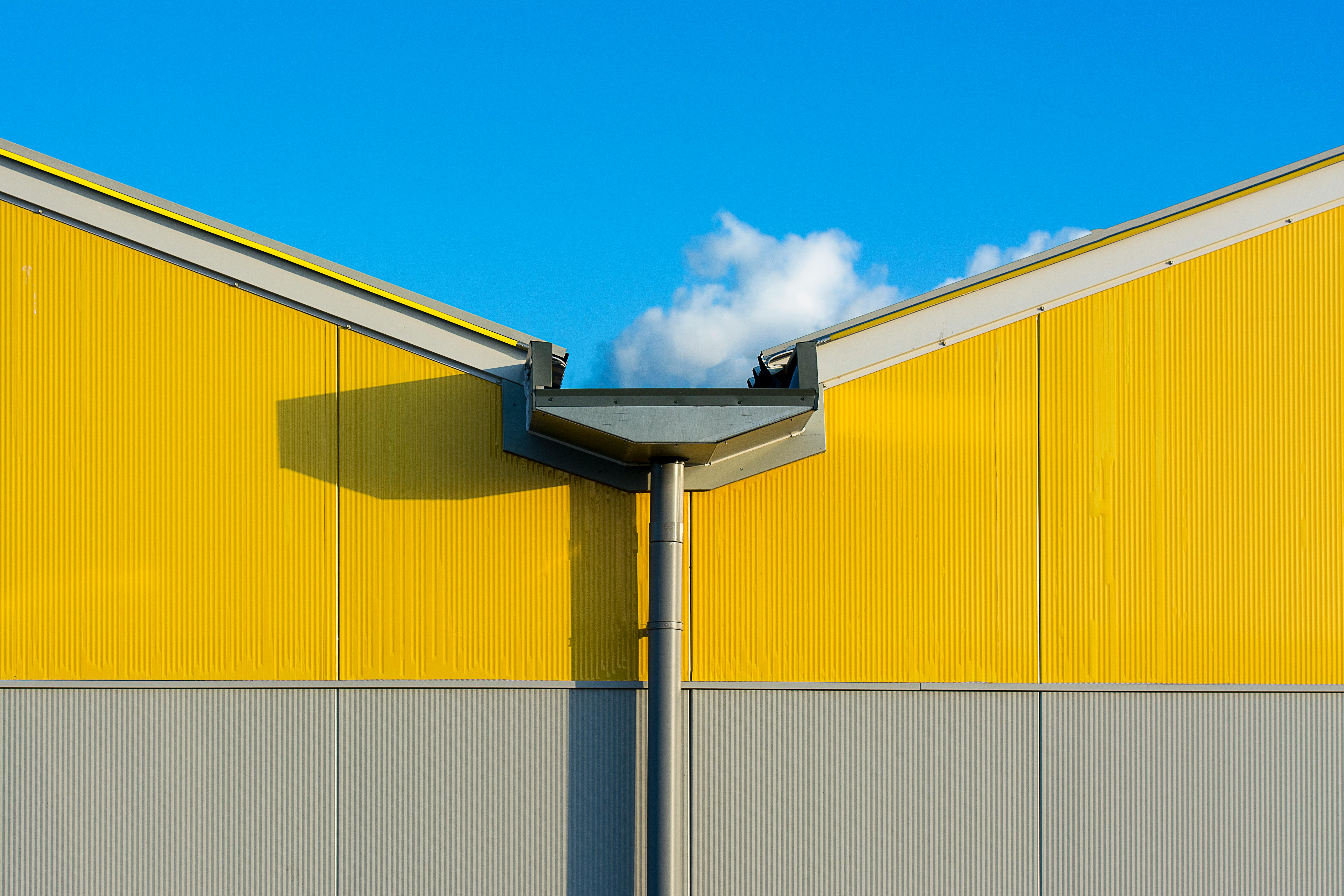 Yellow and Gray Exterior of a Building · Free Stock Photo