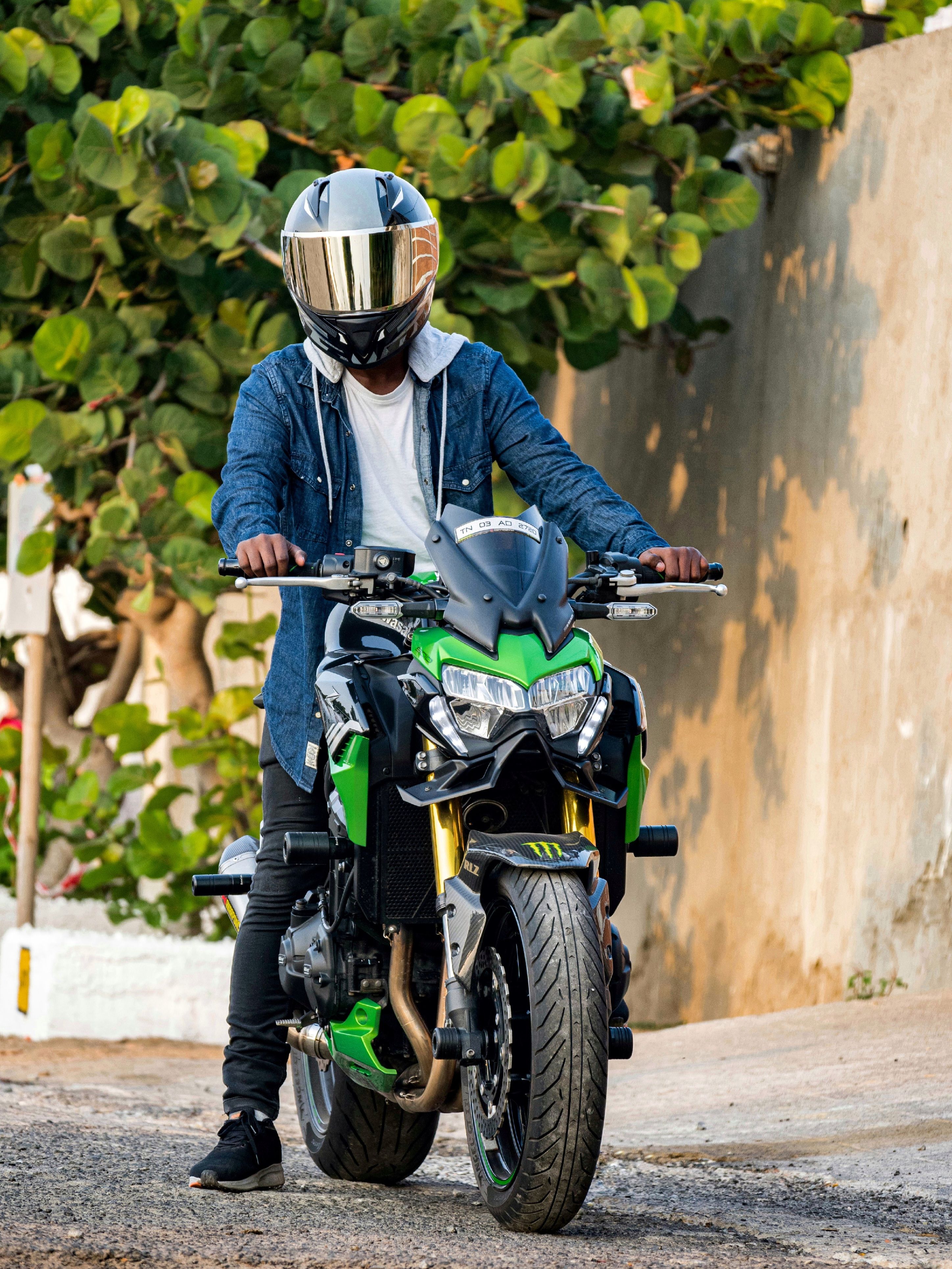 Man in Black Leather Jacket Riding Motorcycle · Free Stock Photo