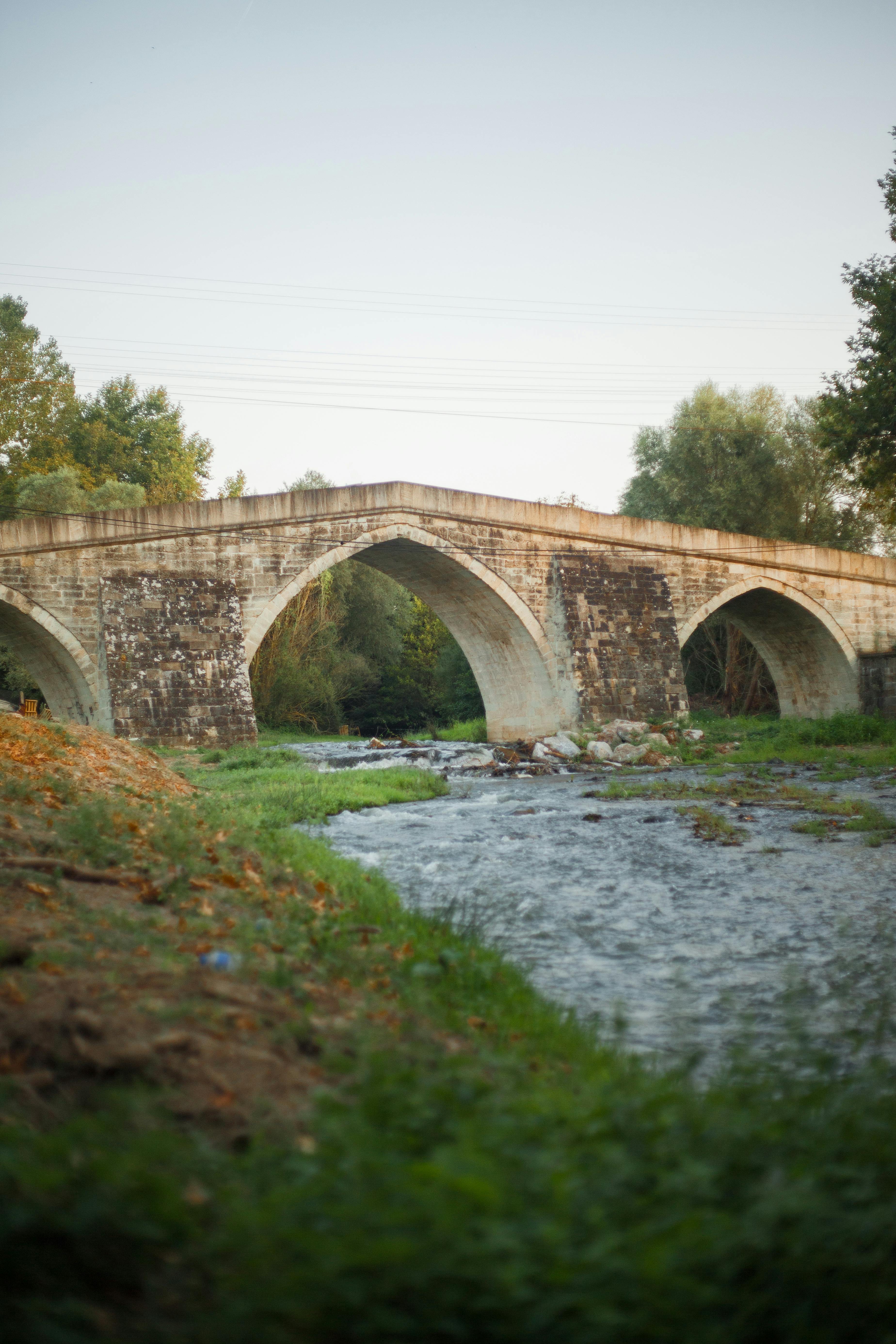 Arched Stone Bridge over River · Free Stock Photo