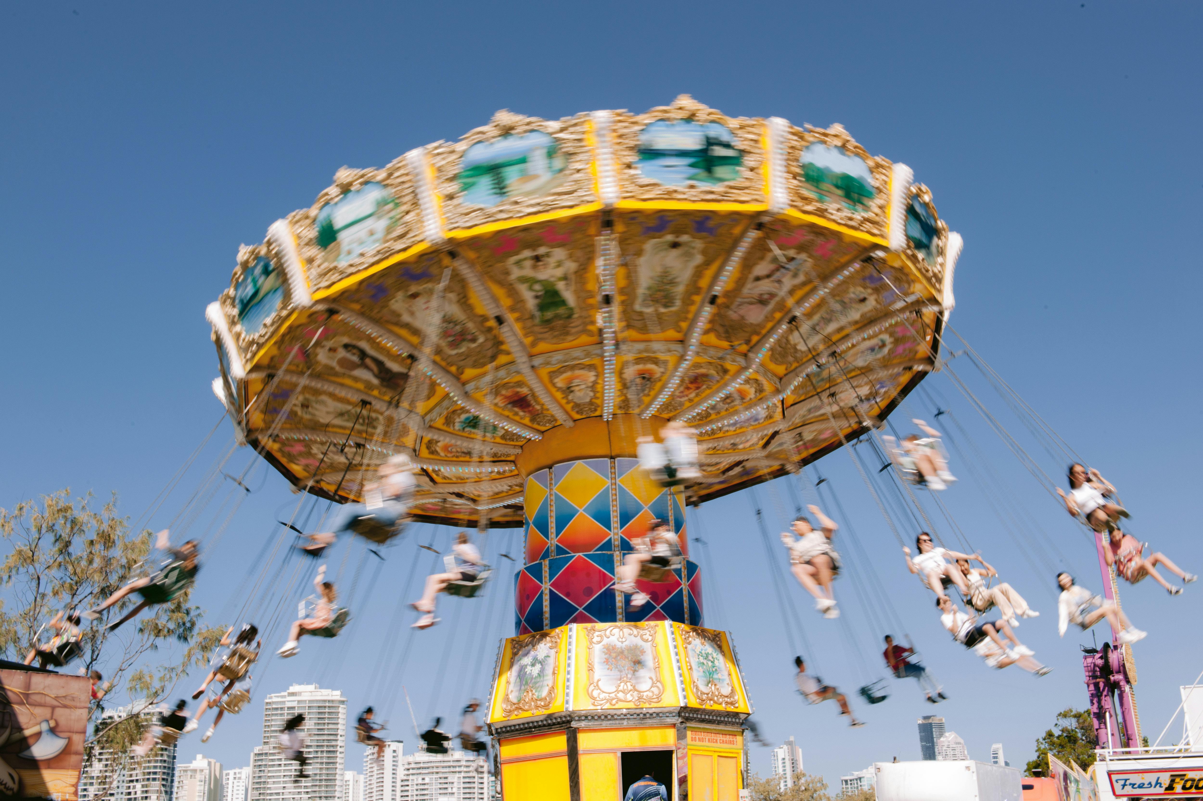Decorative Carousel with People in Motion Blur · Free Stock Photo