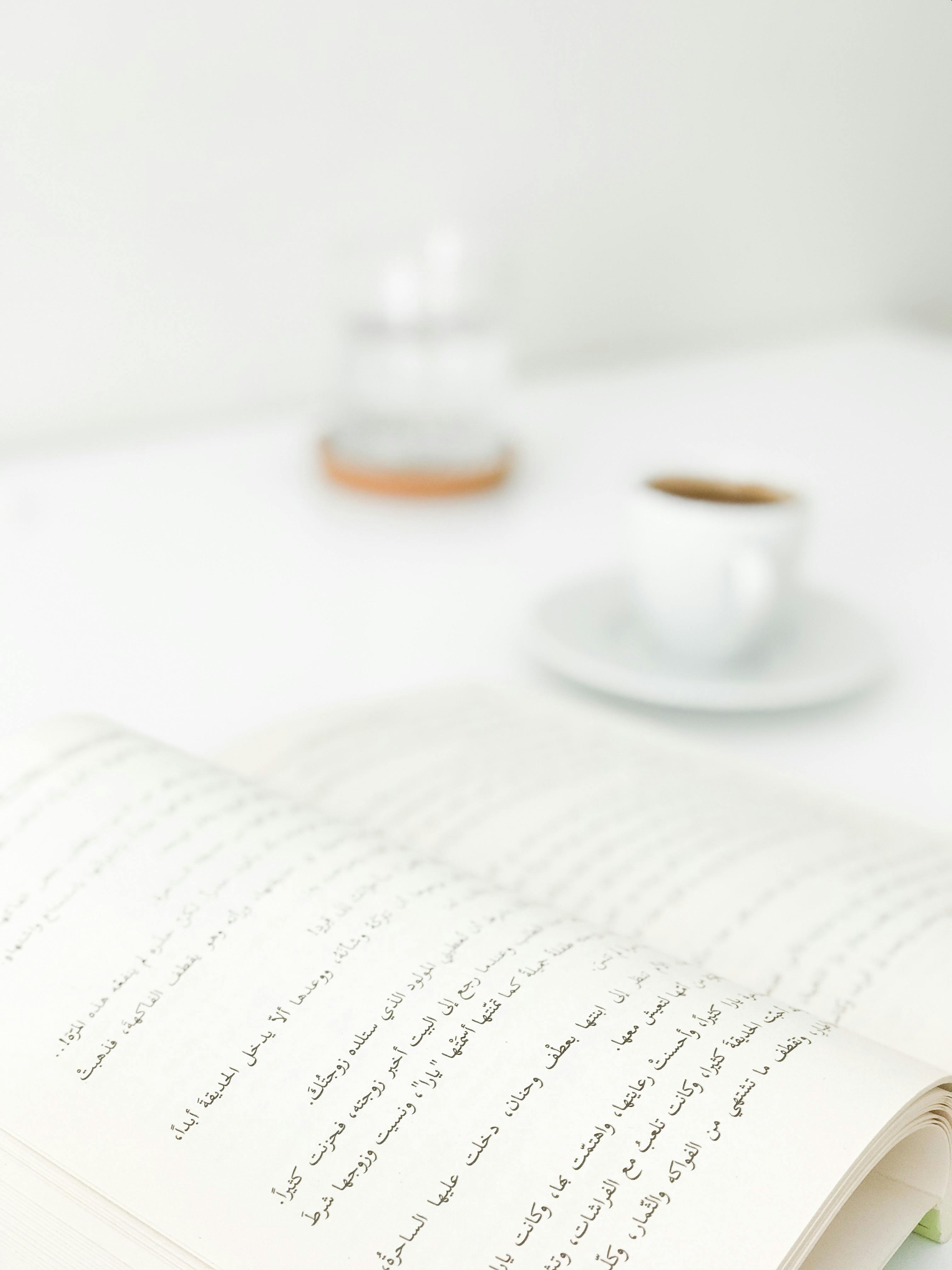 Open Book with Arabic Script · Free Stock Photo