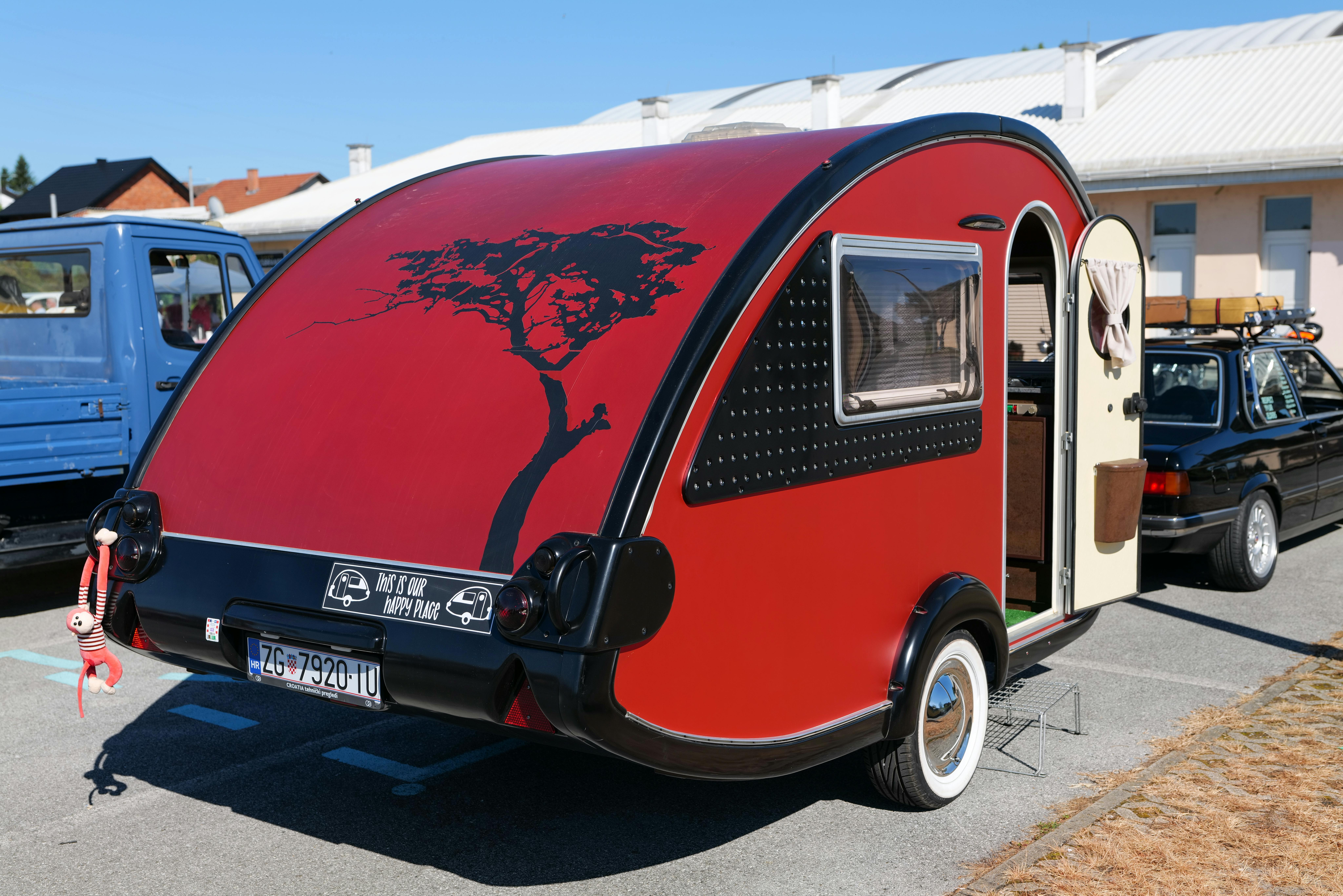 Tree on Red RV Trailer · Free Stock Photo