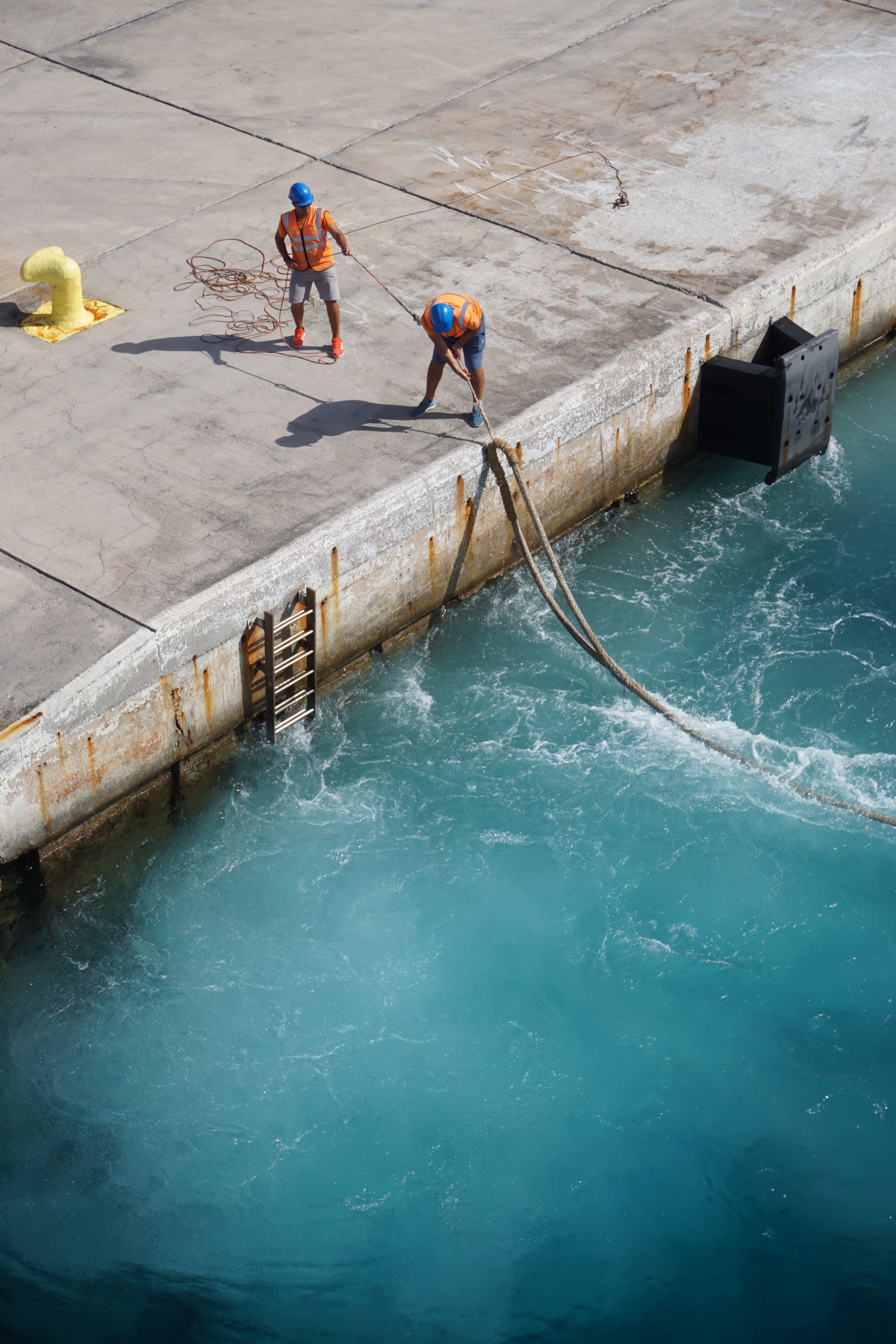 Workers on Sea Shore · Free Stock Photo