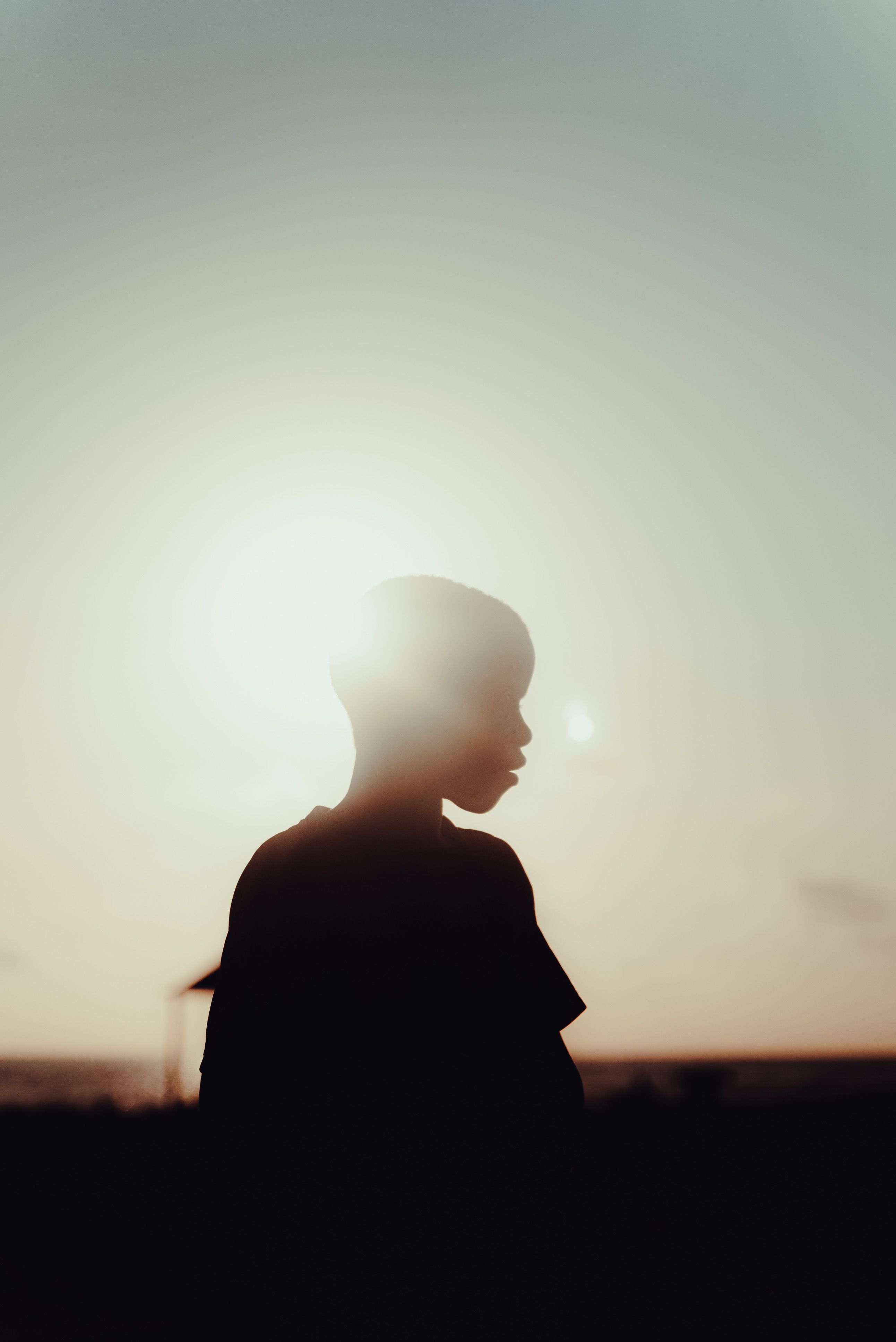 Sunlight over Standing Boy · Free Stock Photo
