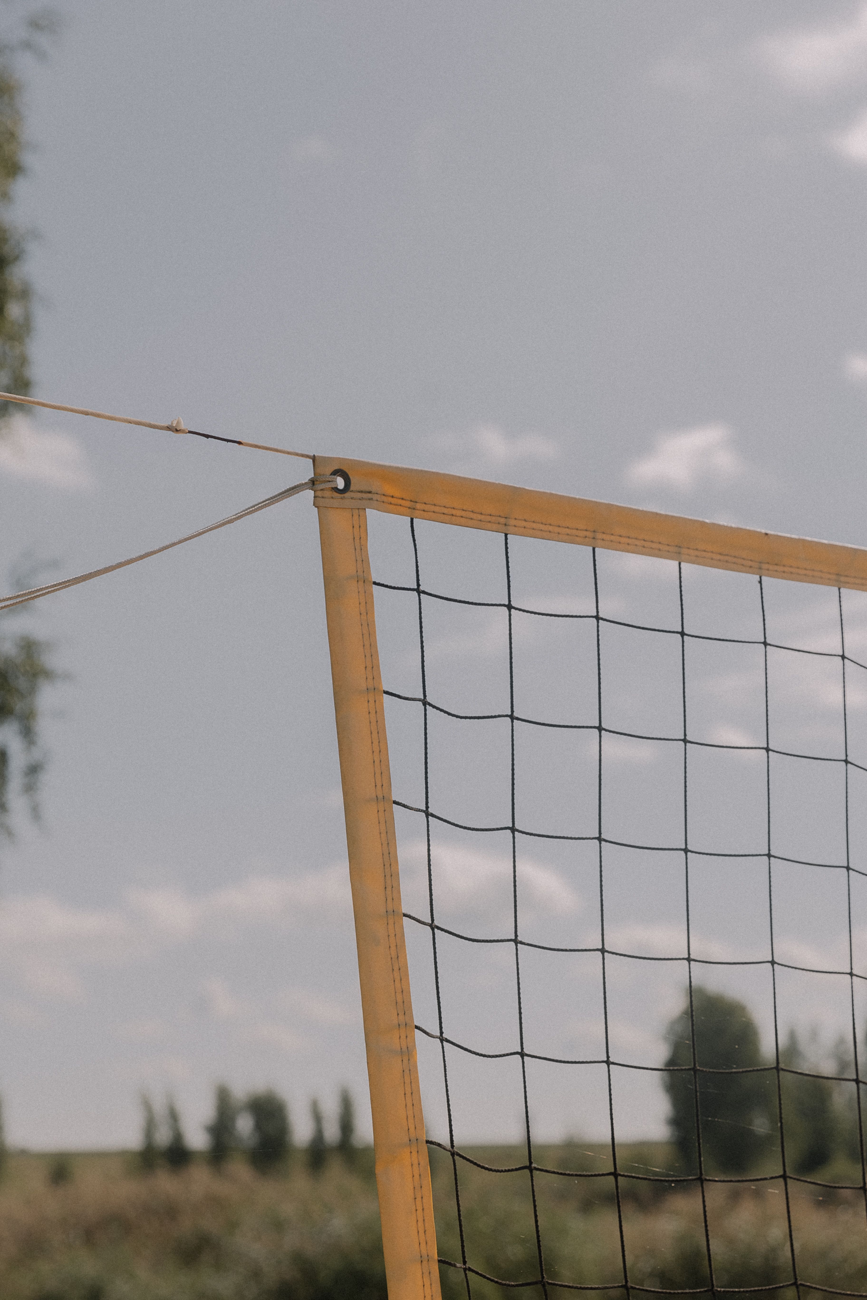 Ball Hitting a Beach Volleyball Net · Free Stock Photo