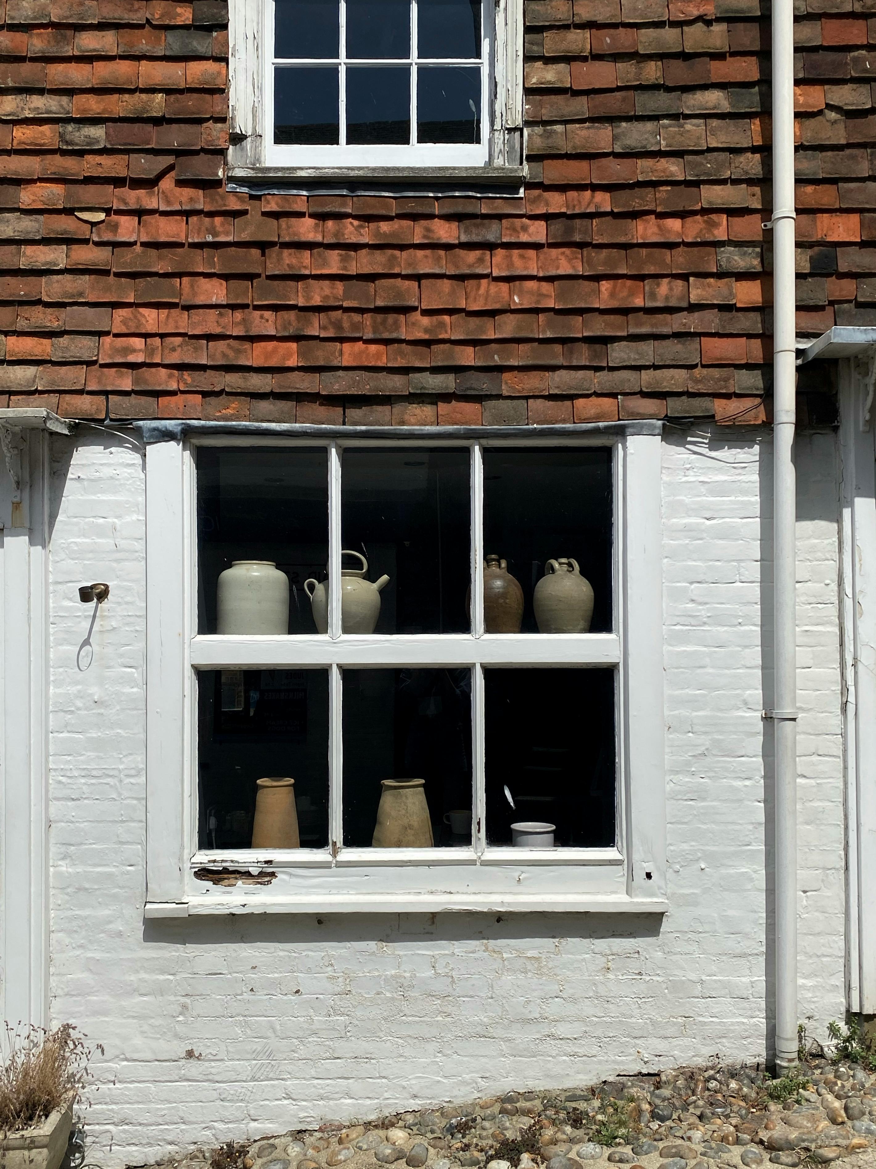 Pottery in Window of Workshop · Free Stock Photo