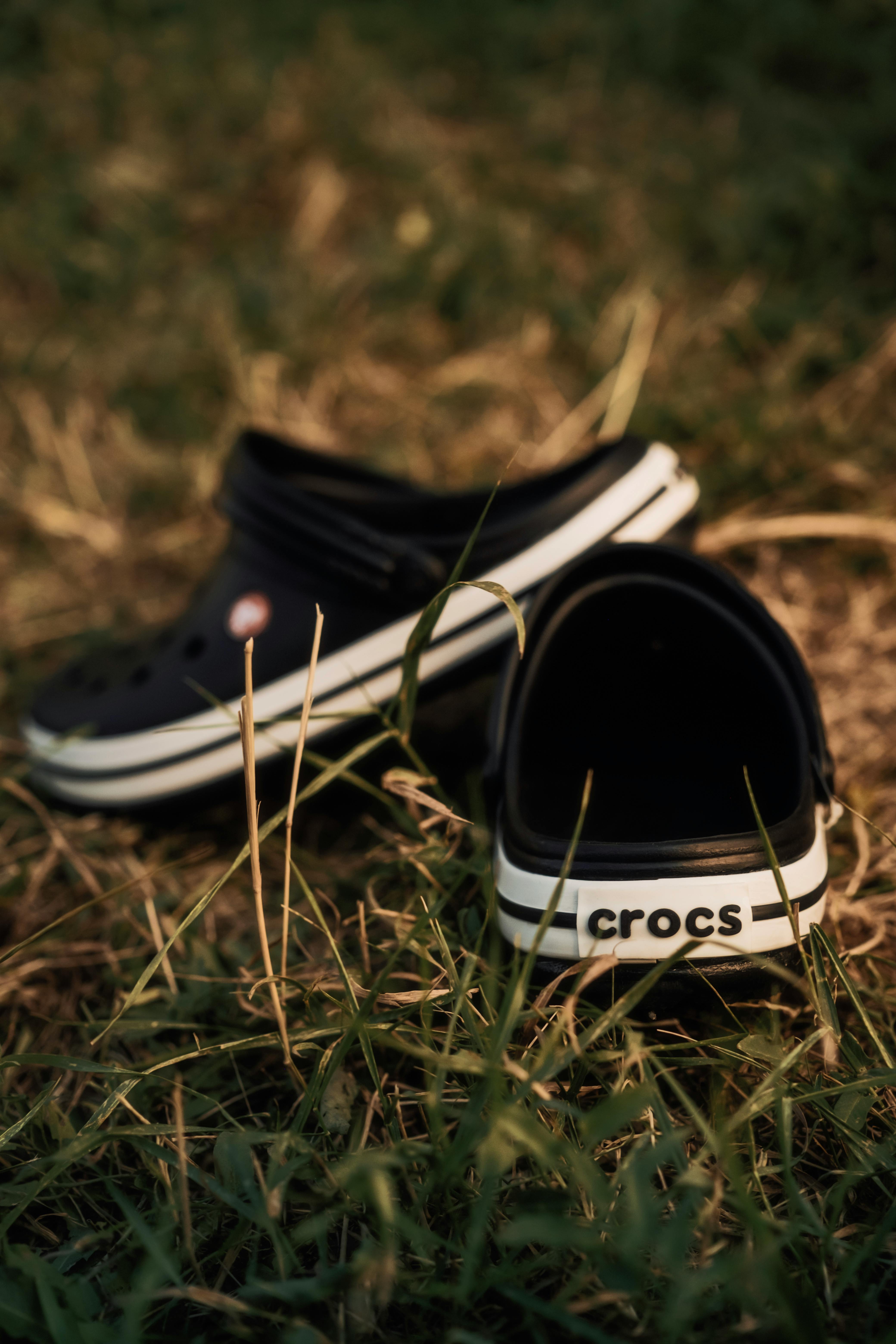 Display of Crocks on Grass · Free Stock Photo