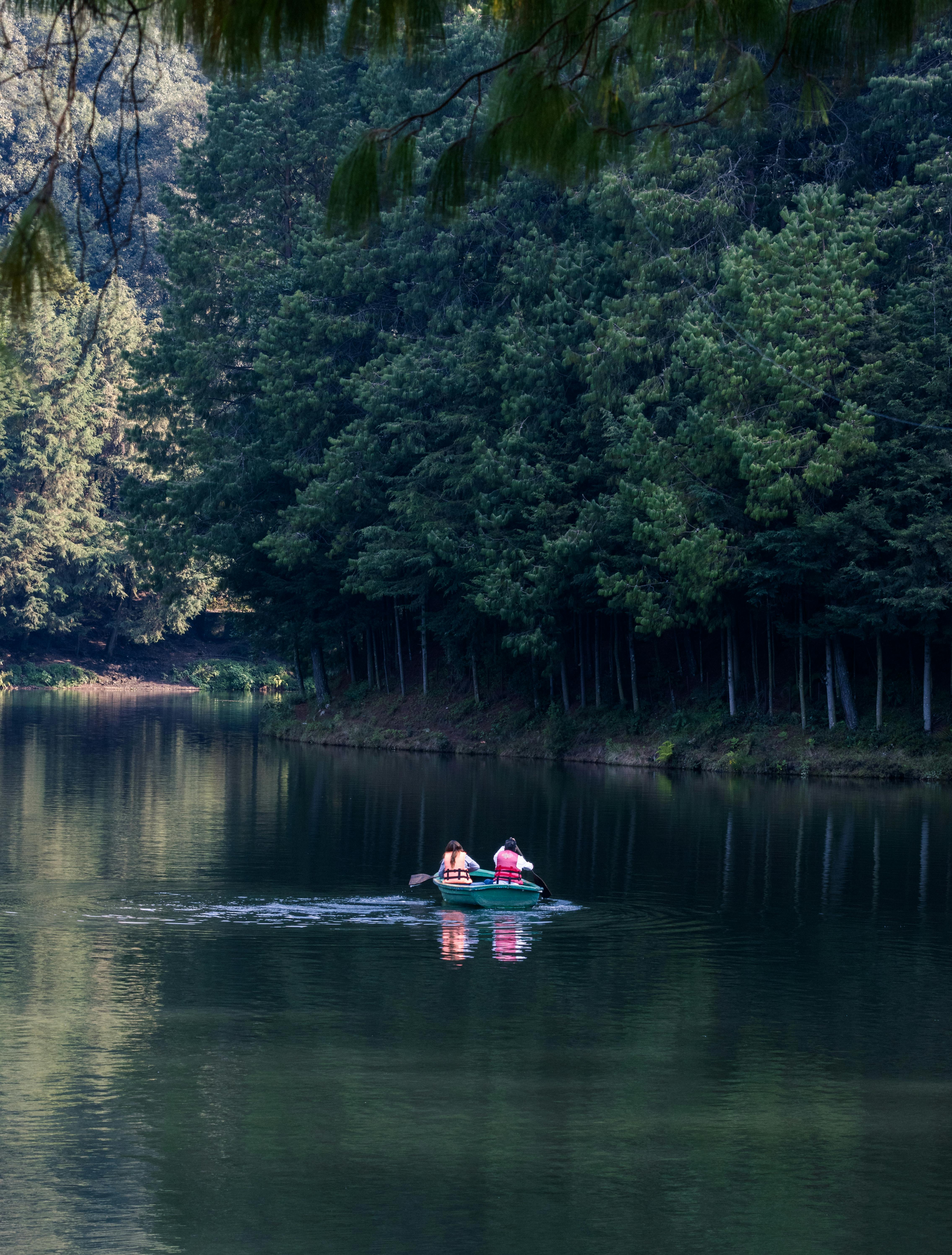 People on a Kayak Swimming in a River · Free Stock Photo