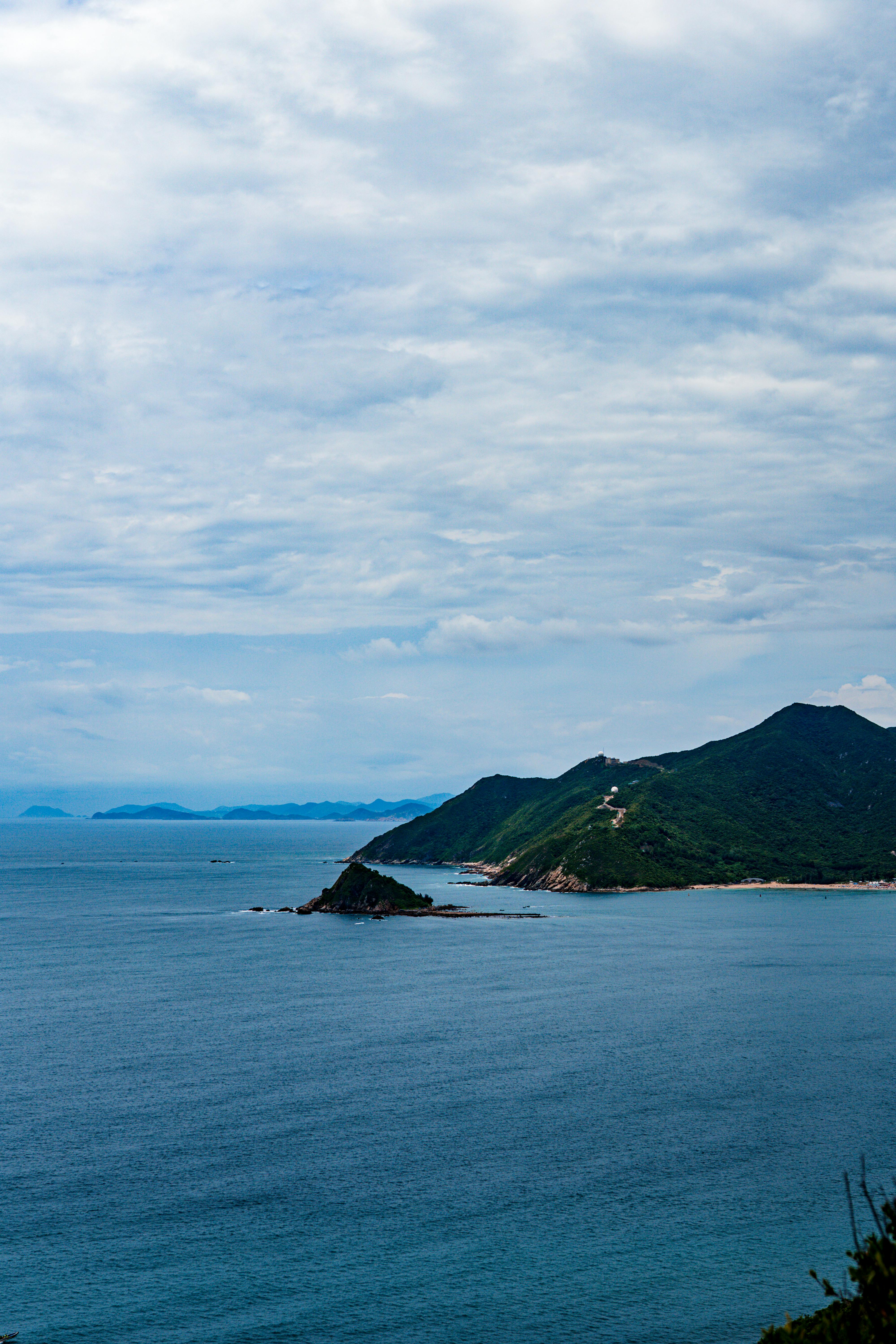 Seascape with a Hilly Island · Free Stock Photo