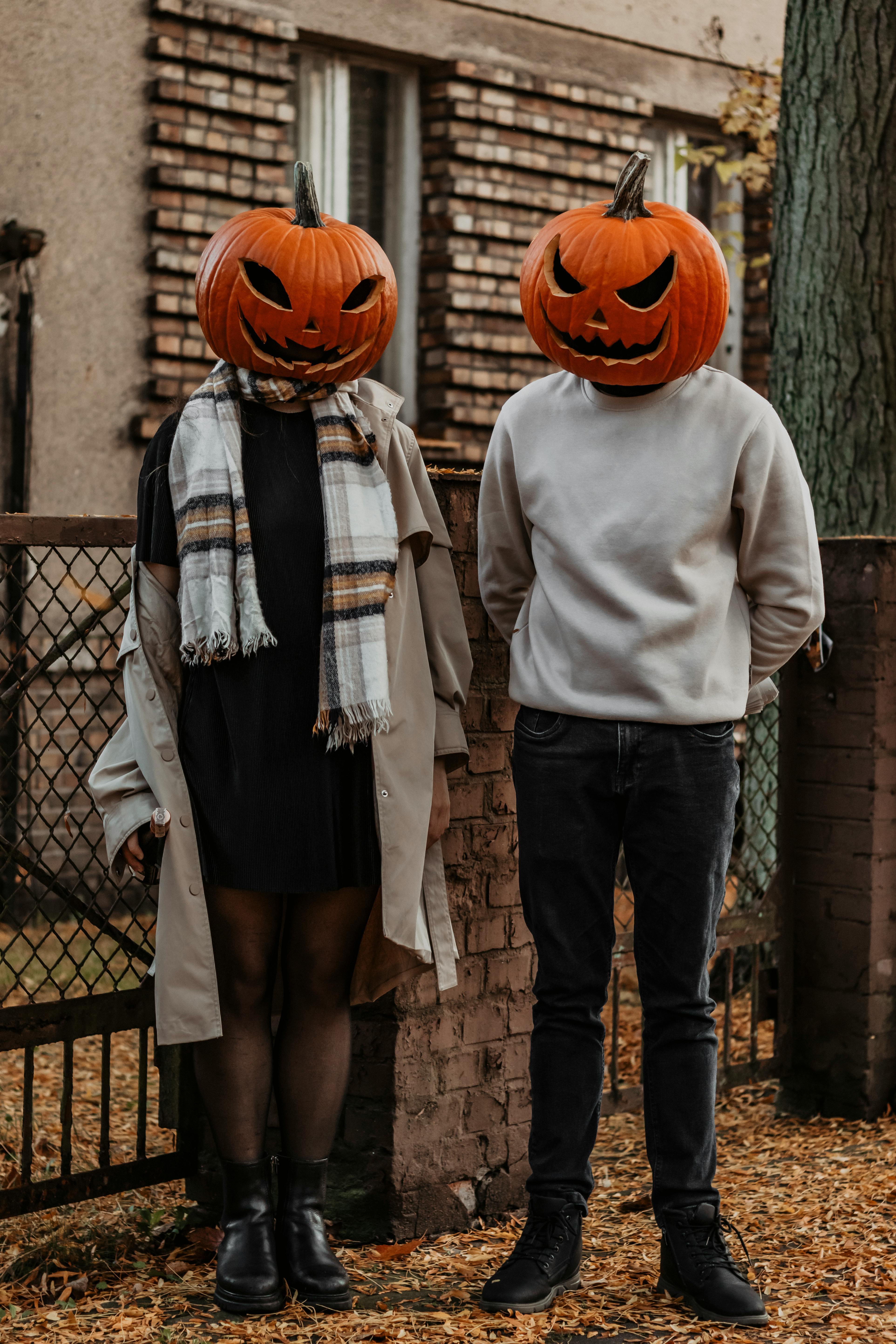 People with Pumpkin Heads for Halloween · Free Stock Photo