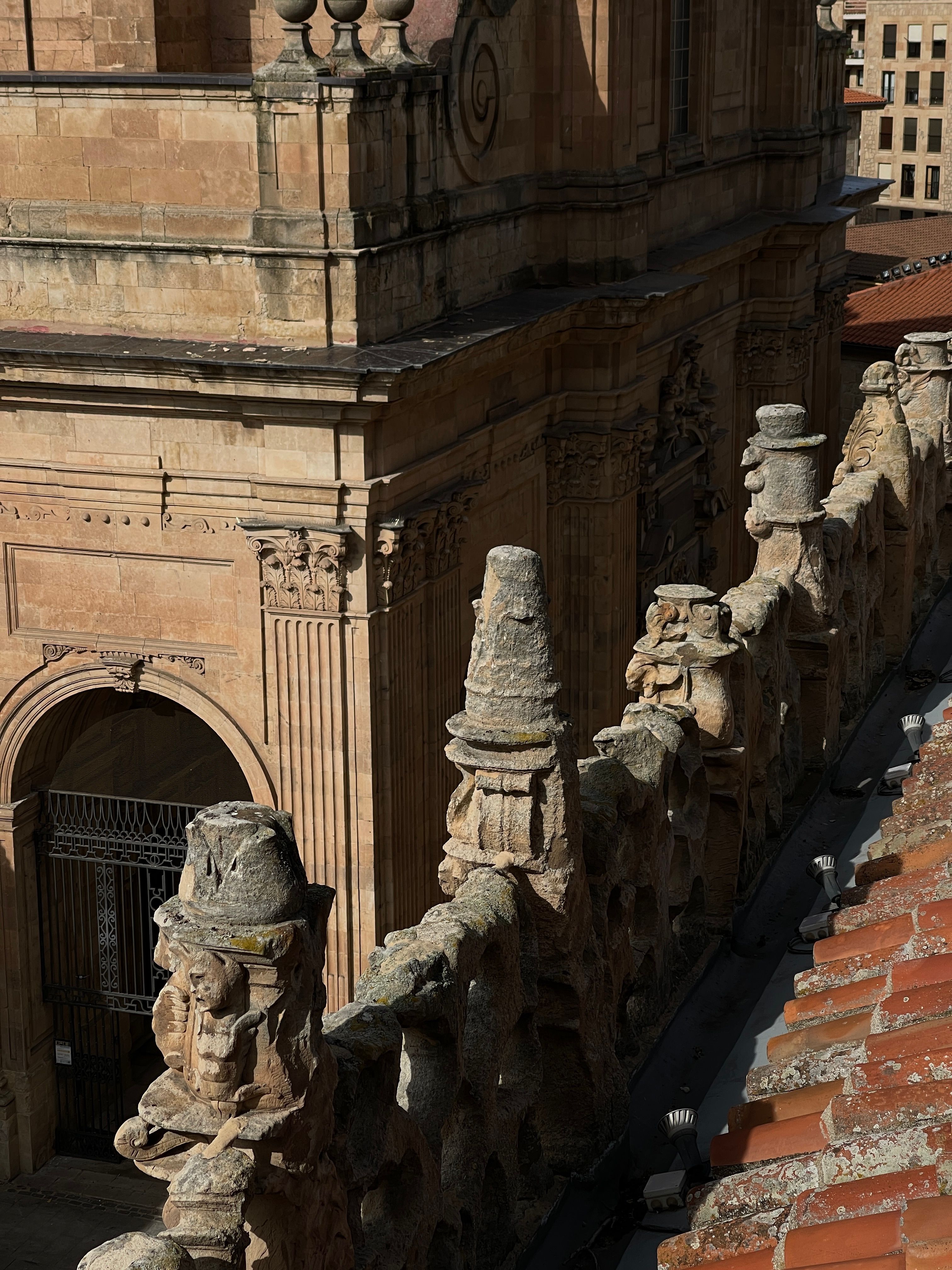 Architectural Details on the Roof of an Antique Building · Free Stock Photo