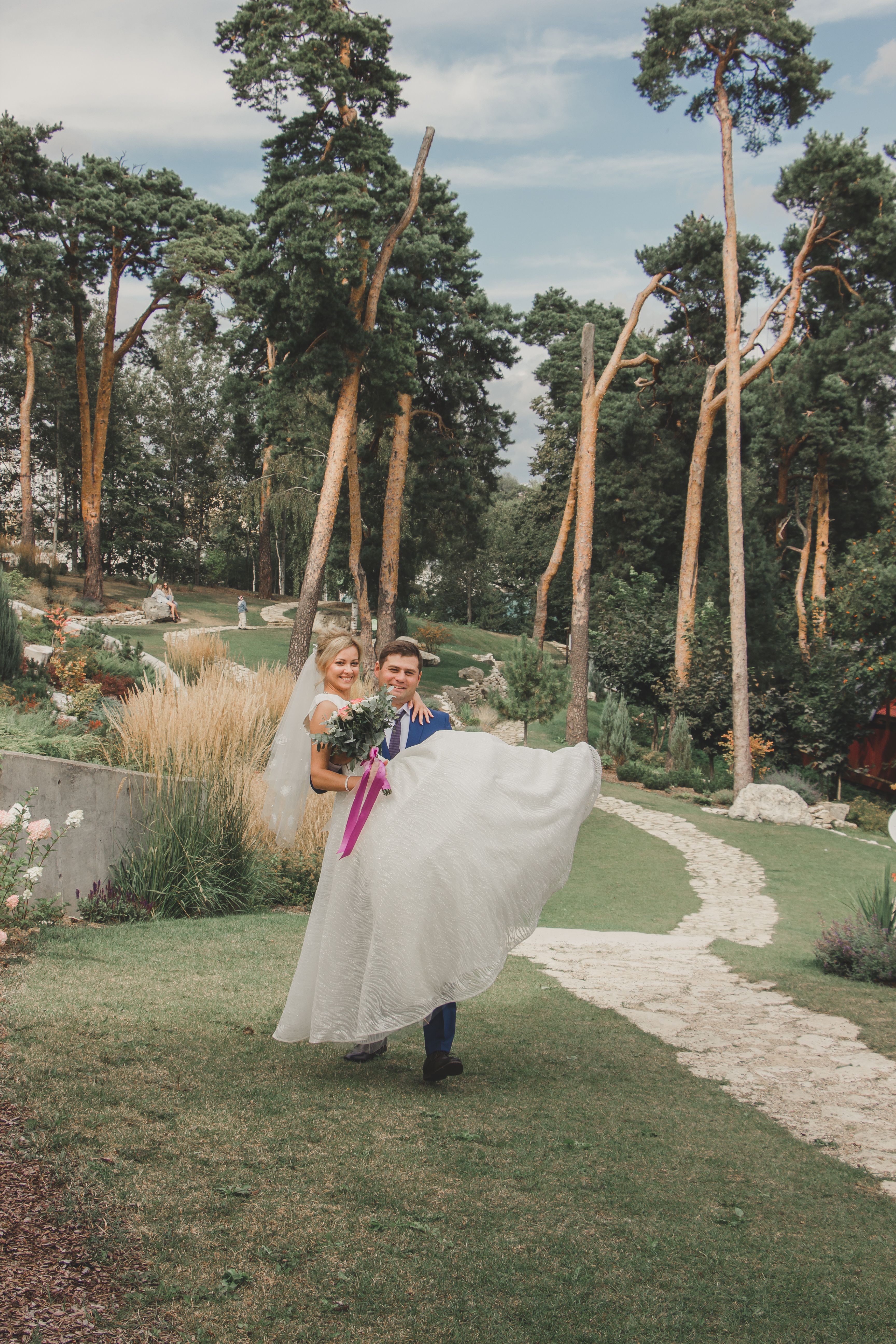 Groom Carrying Bride · Free Stock Photo
