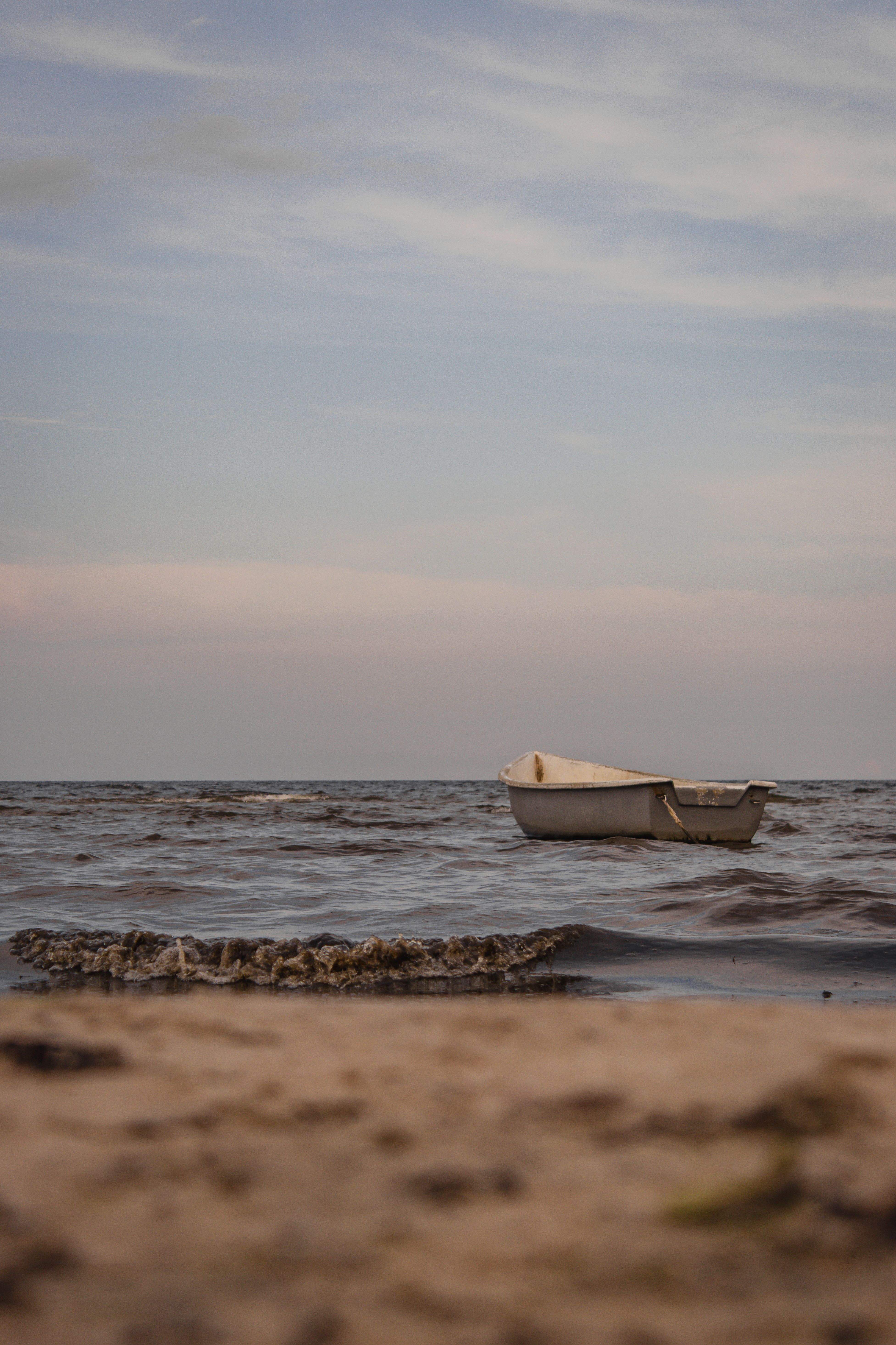 Empty Boat on Sea Shore · Free Stock Photo
