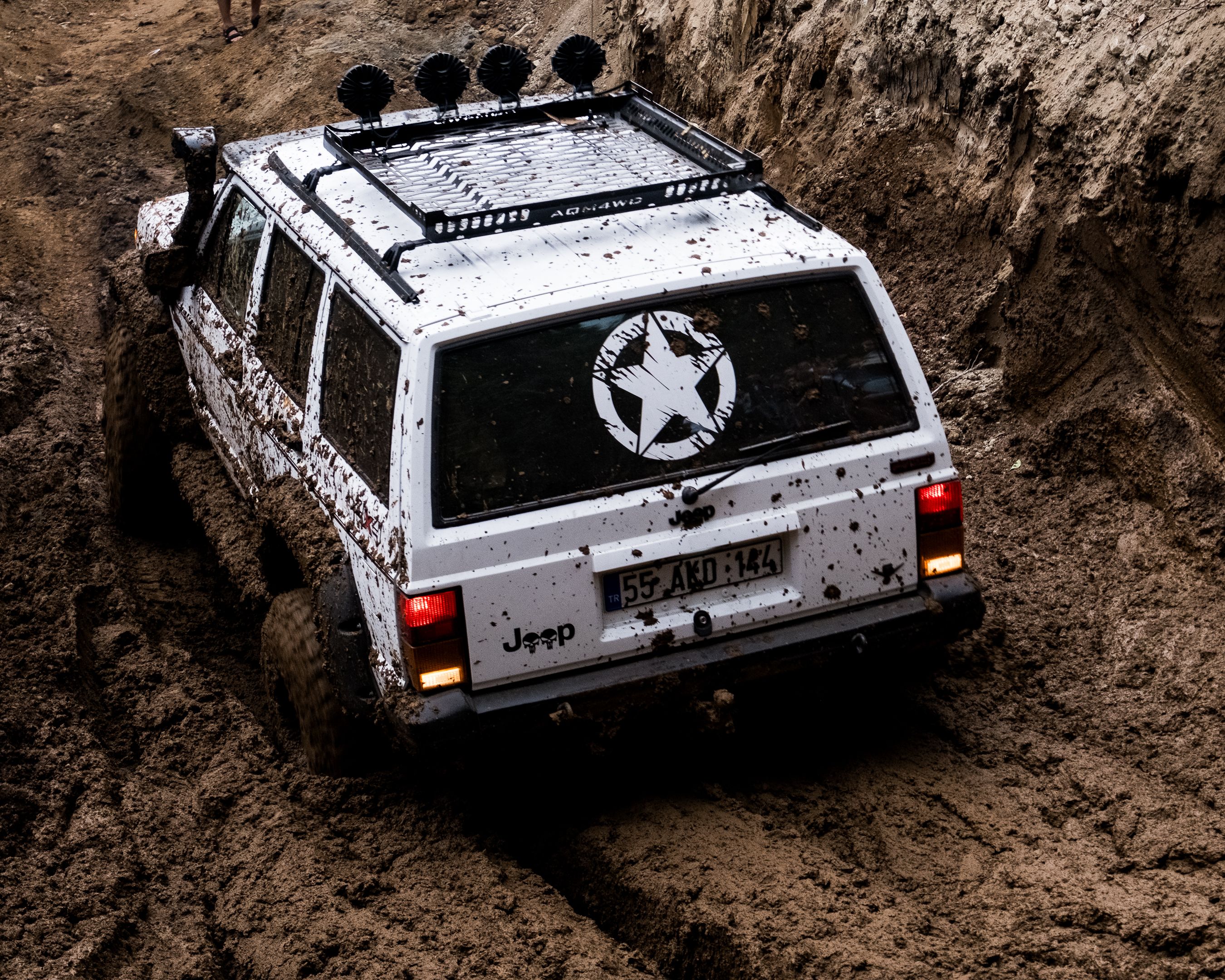 Jeep Cherokee in a Ditch with Mud · Free Stock Photo