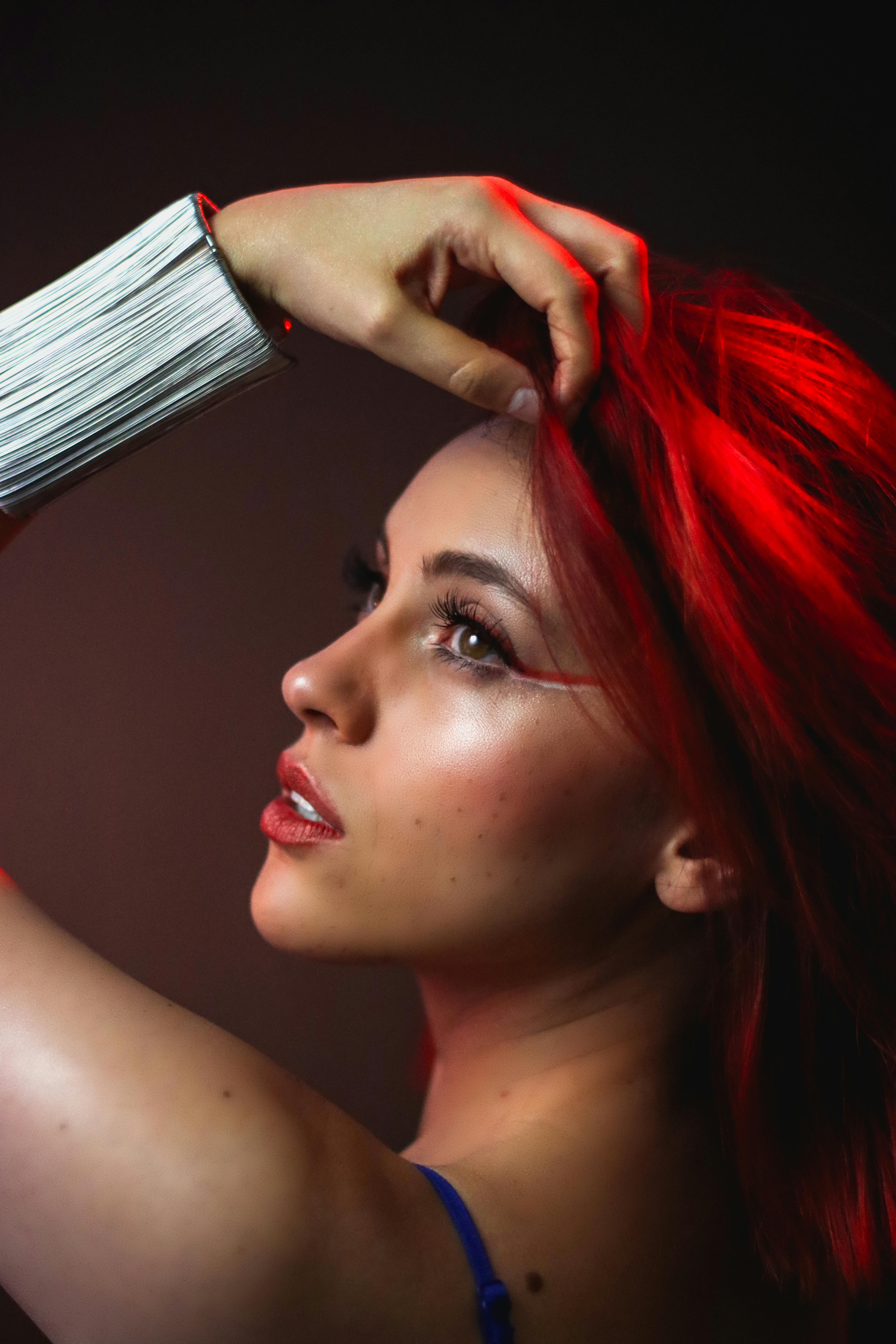 Woman Fixing Hair · Free Stock Photo