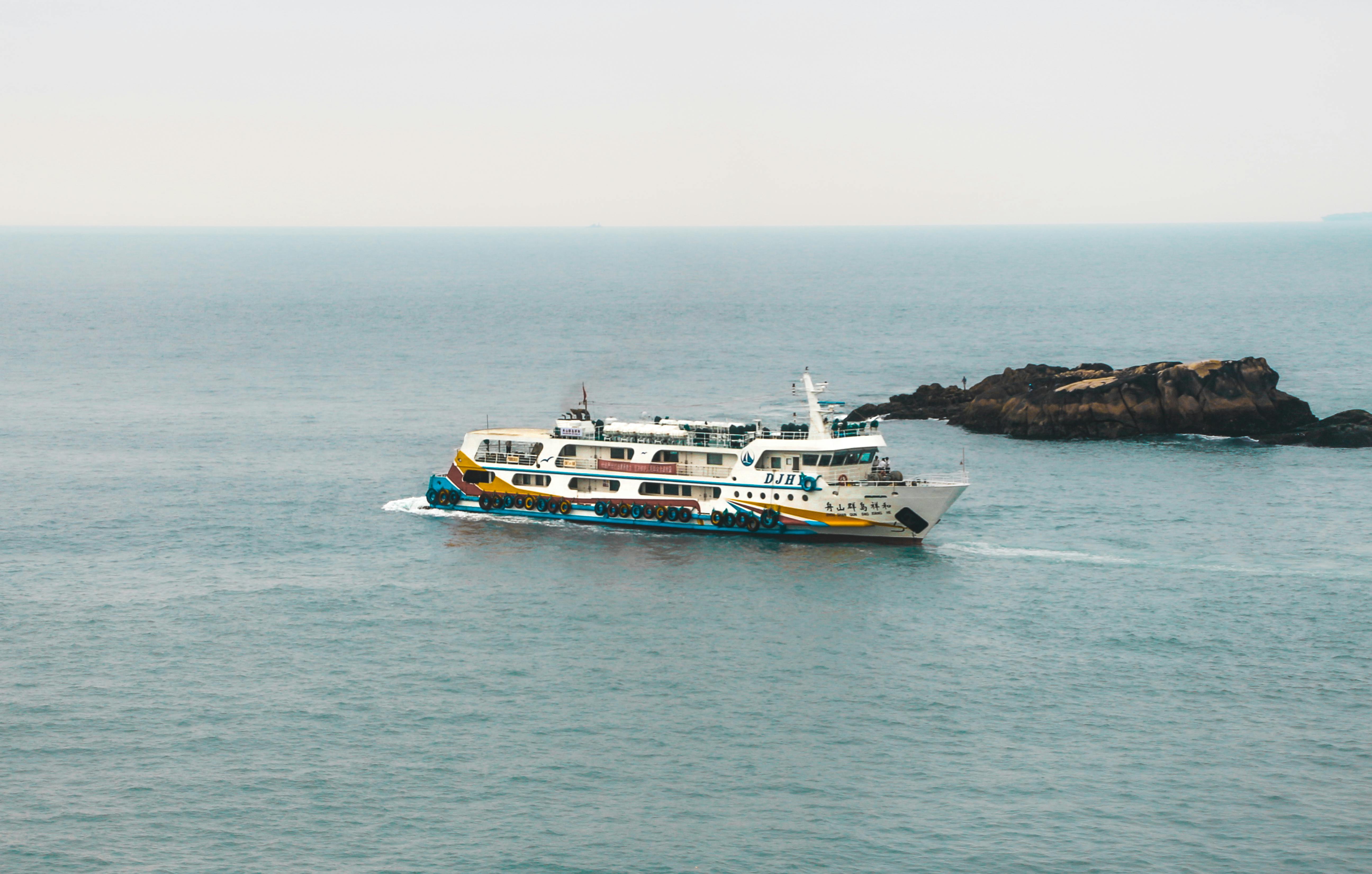 Ferry Swimming on a Sea · Free Stock Photo