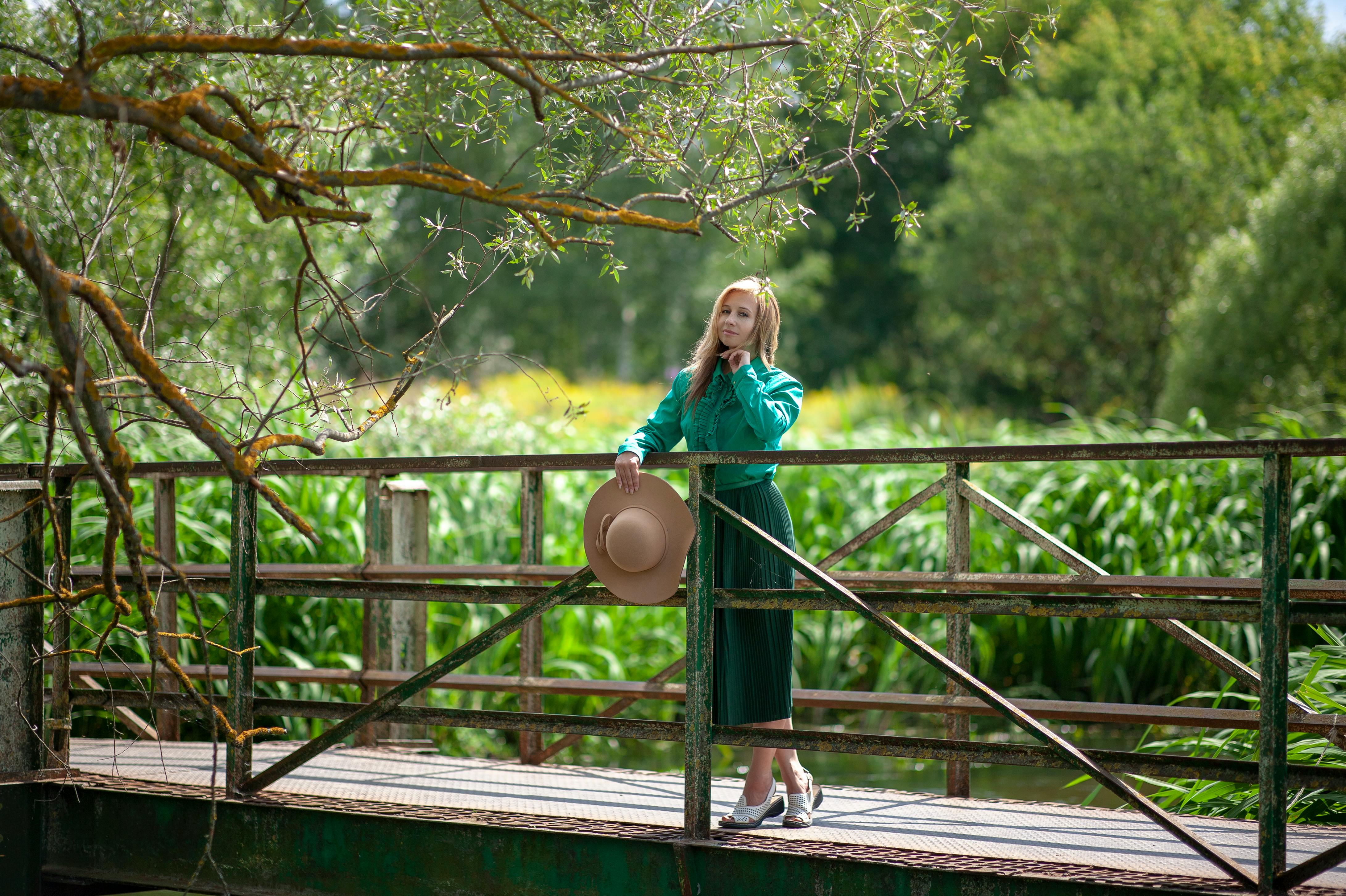 Woman Posing on a Small Bridge · Free Stock Photo