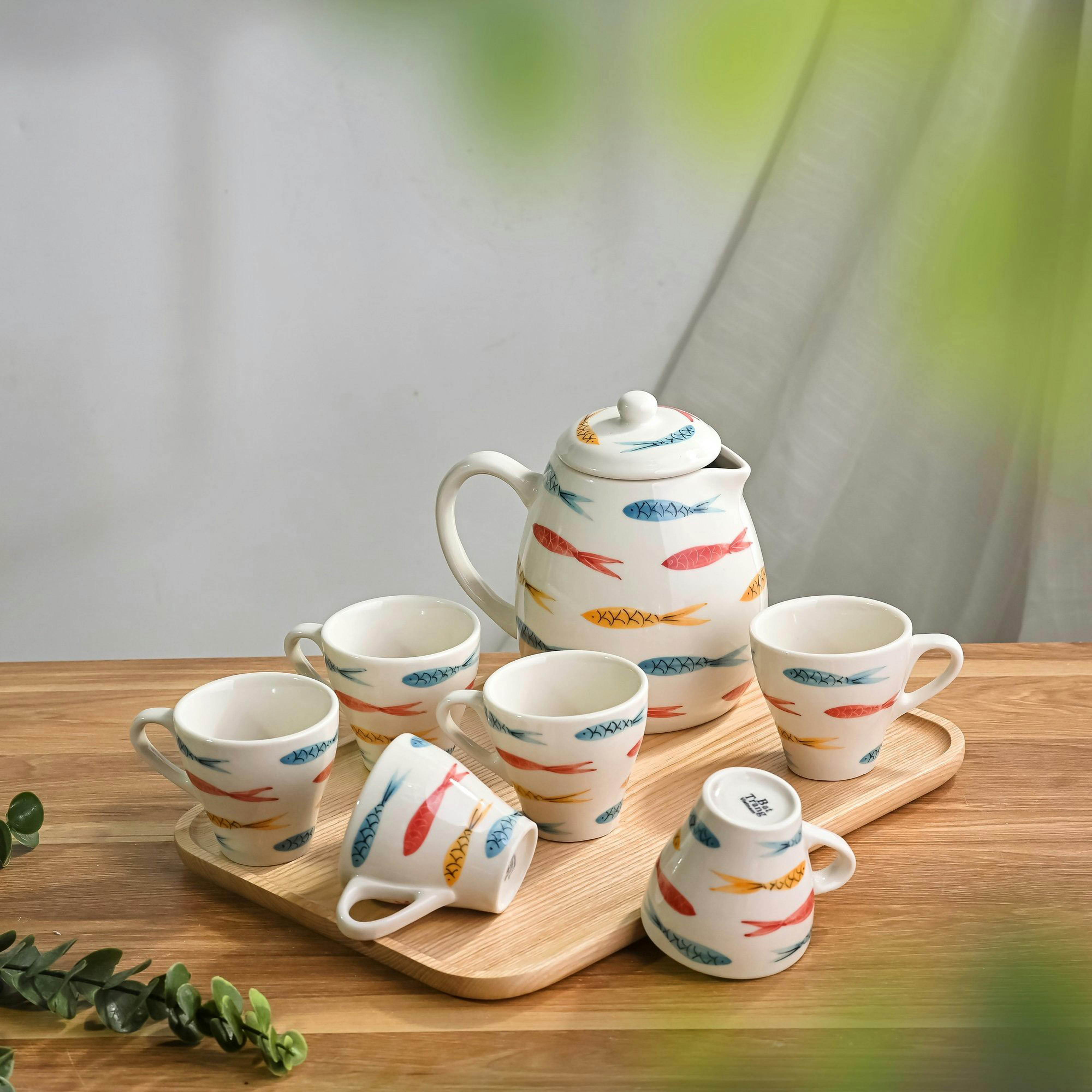 A Set of Pottery with Colorful Fish Patterns · Free Stock Photo