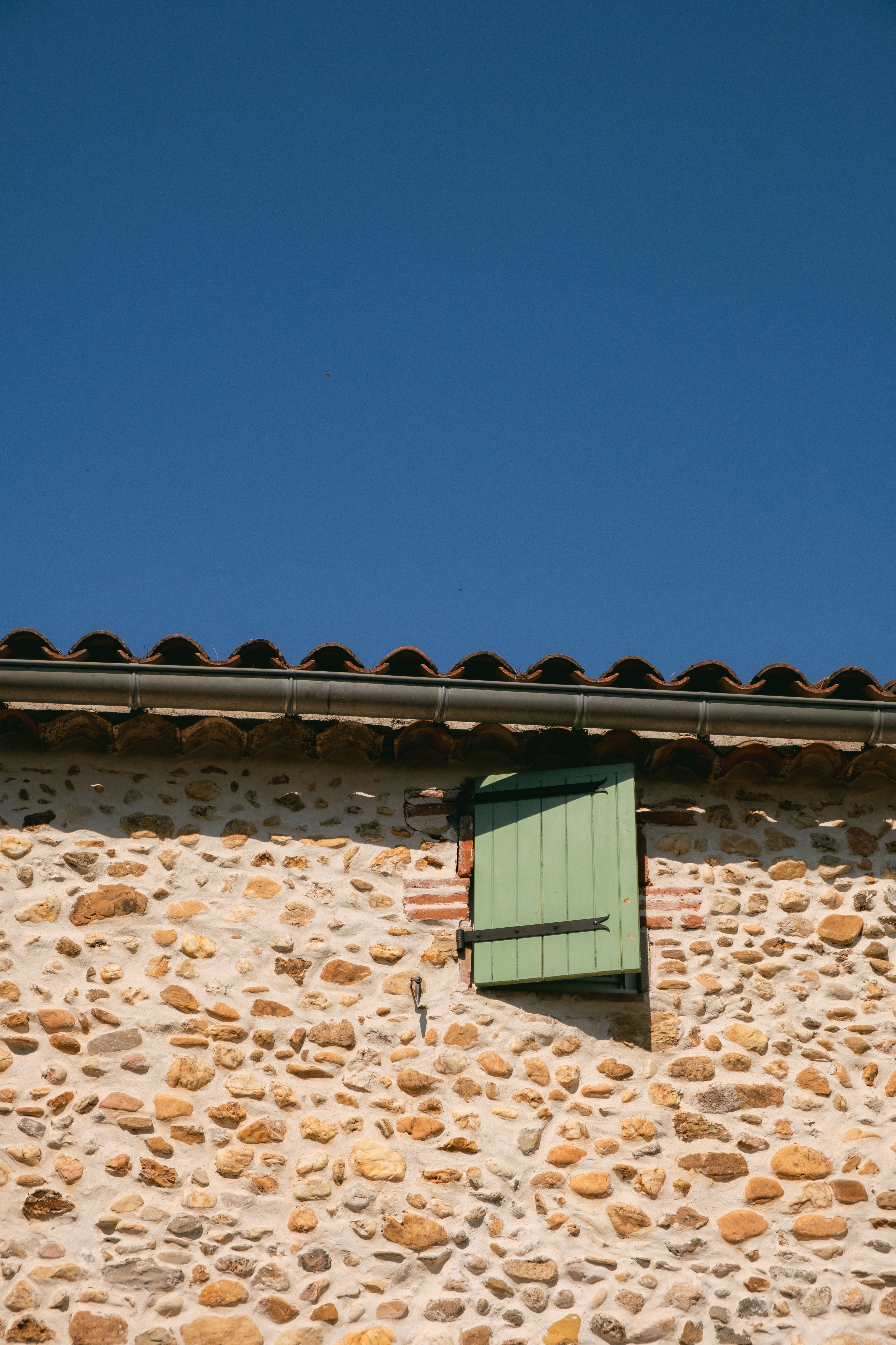 Stone Wall of a Building · Free Stock Photo