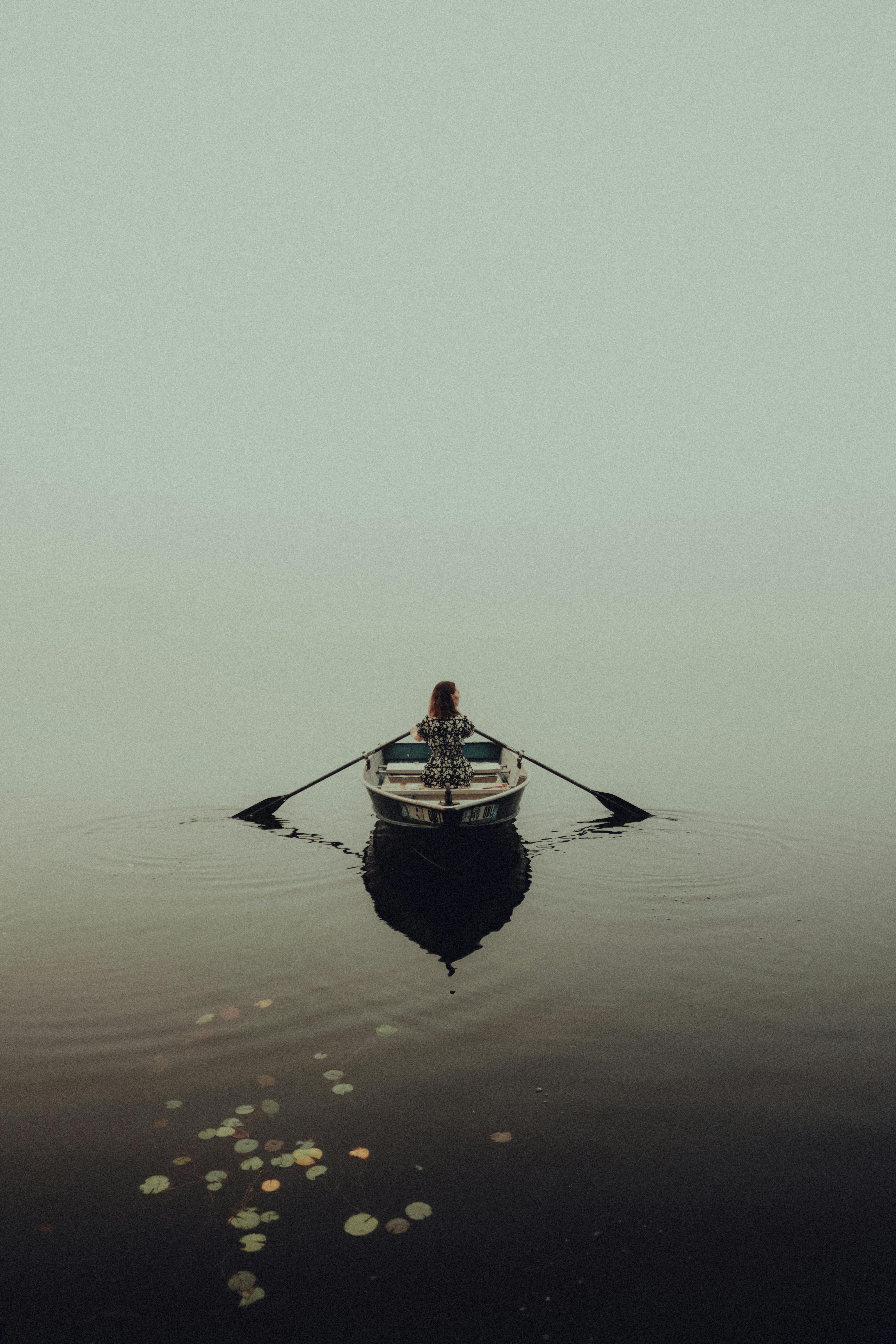 Woman Swimming on Boat on Lake · Free Stock Photo