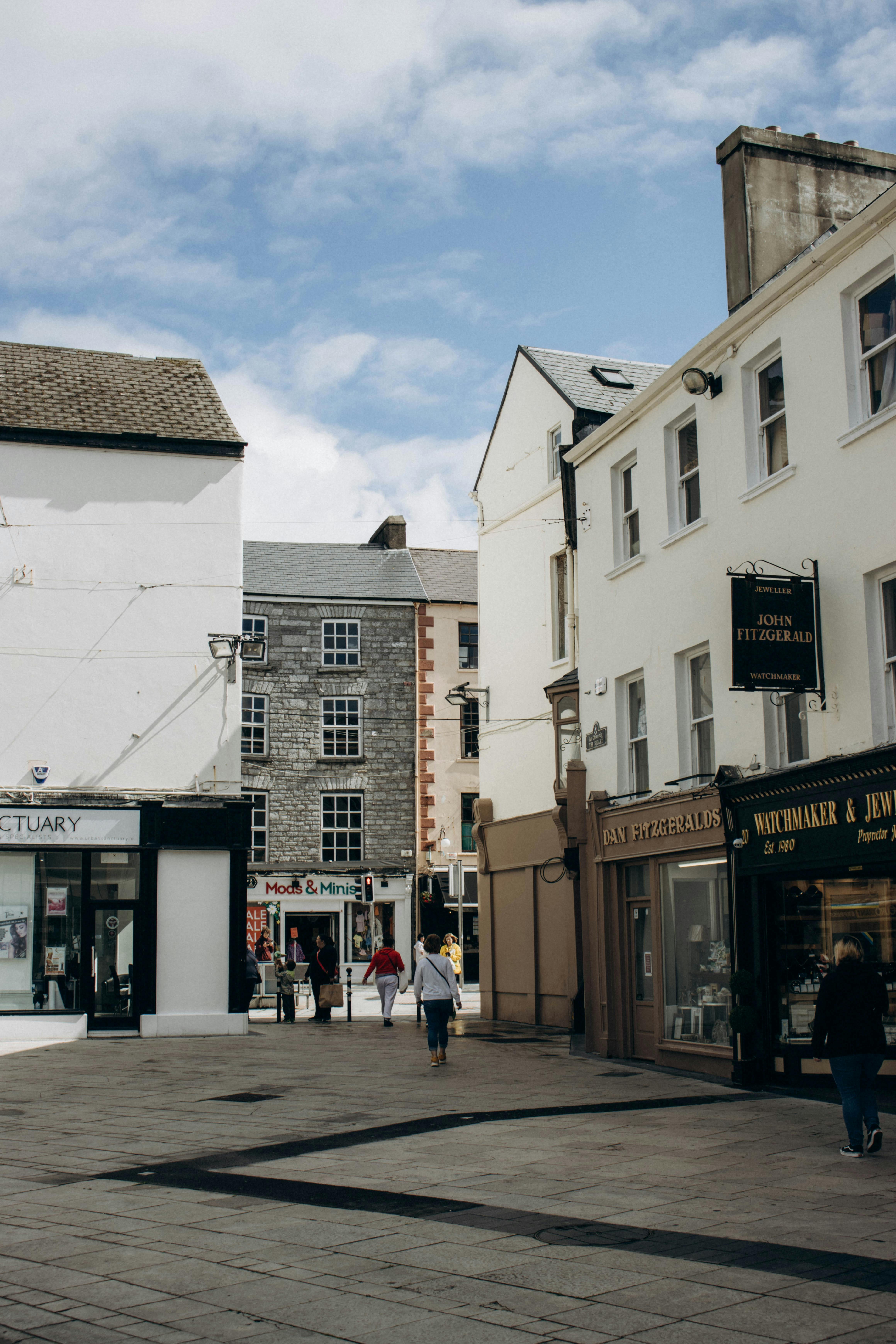 People Walking on a Town Square in Tralee, Ireland · Free Stock Photo