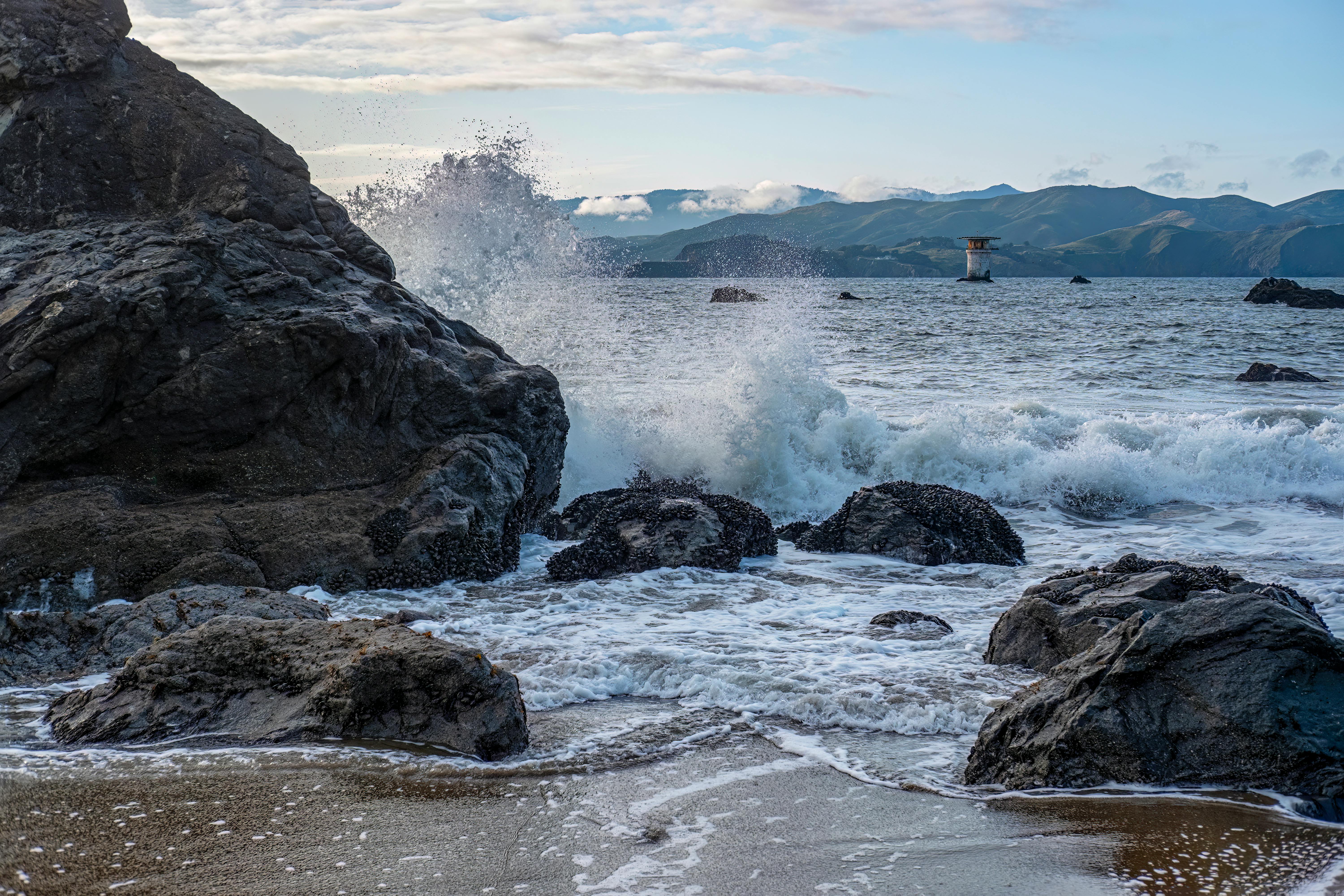 Sea Splashing on Rock · Free Stock Photo