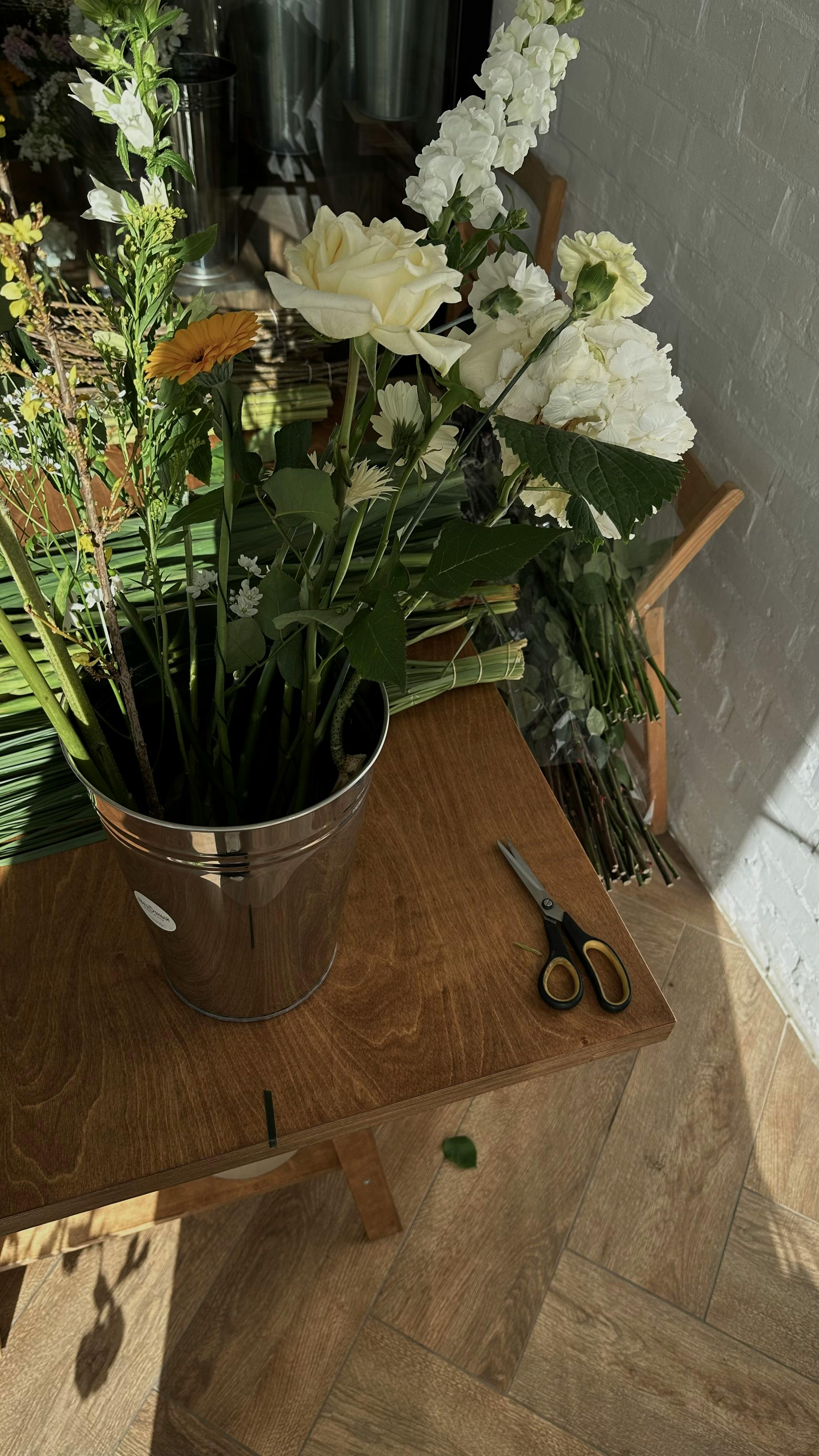 Flower Arrangement in a Bucket · Free Stock Photo