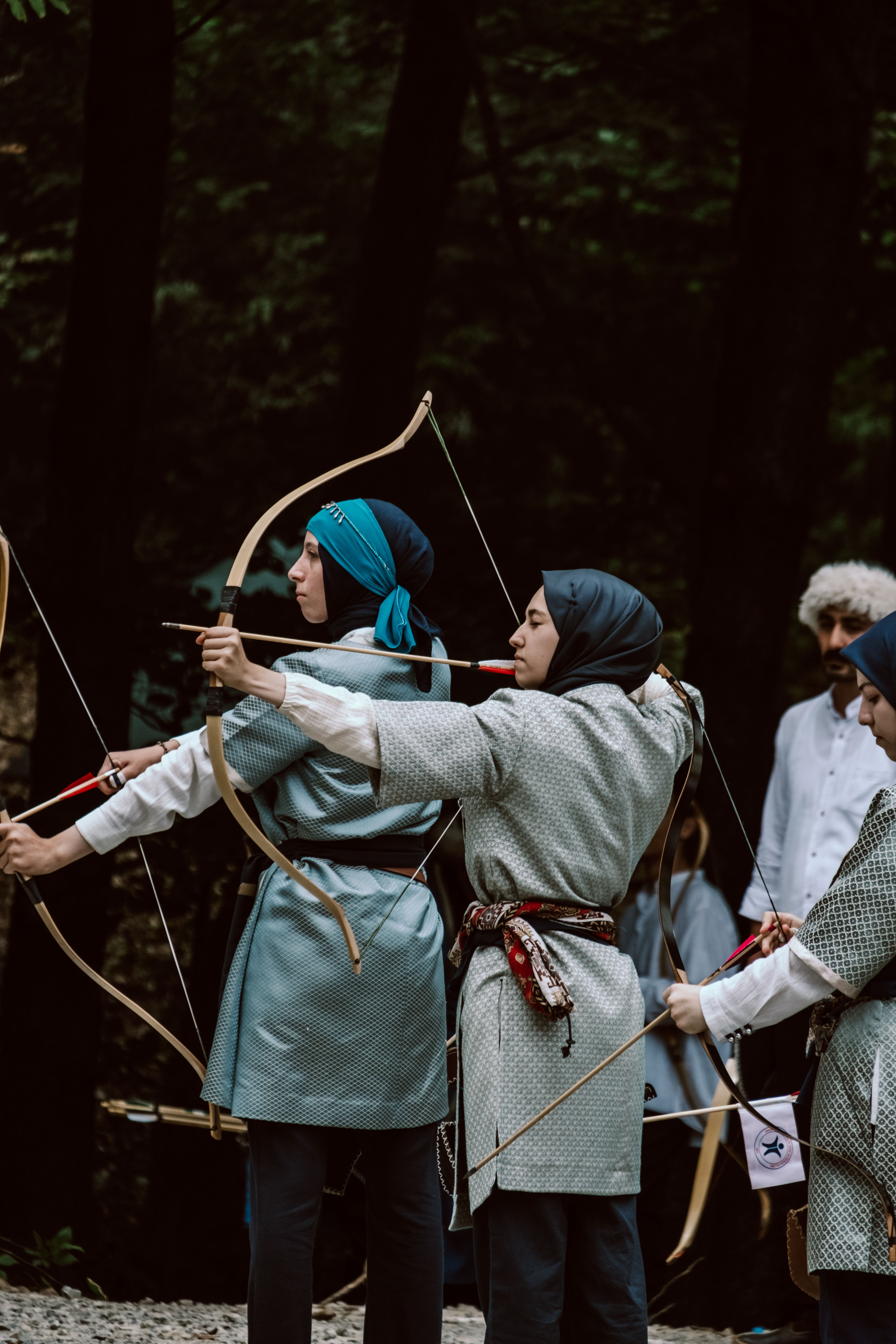 People Shooting with Bows · Free Stock Photo