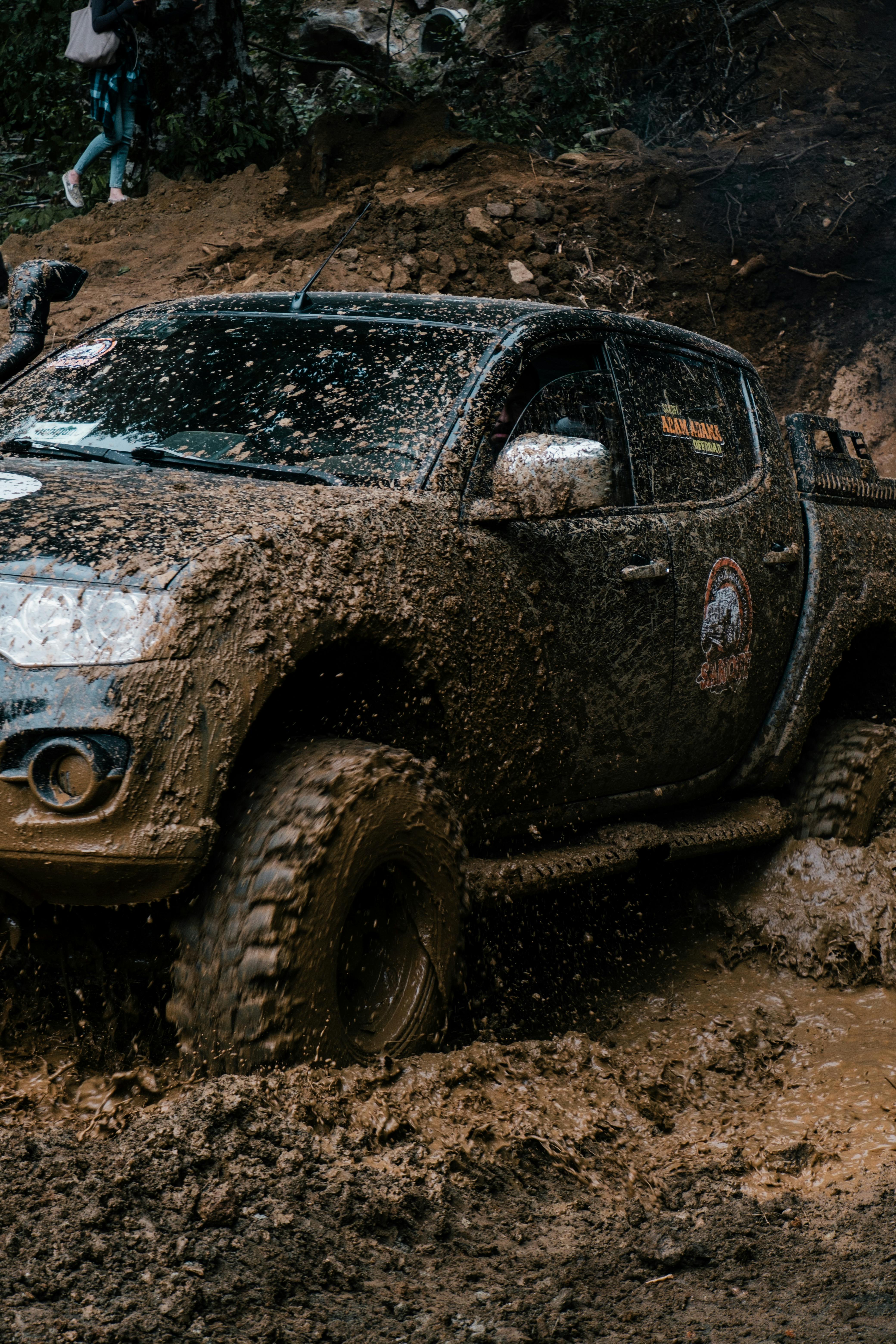Pick-up Track Racing in Mud · Free Stock Photo
