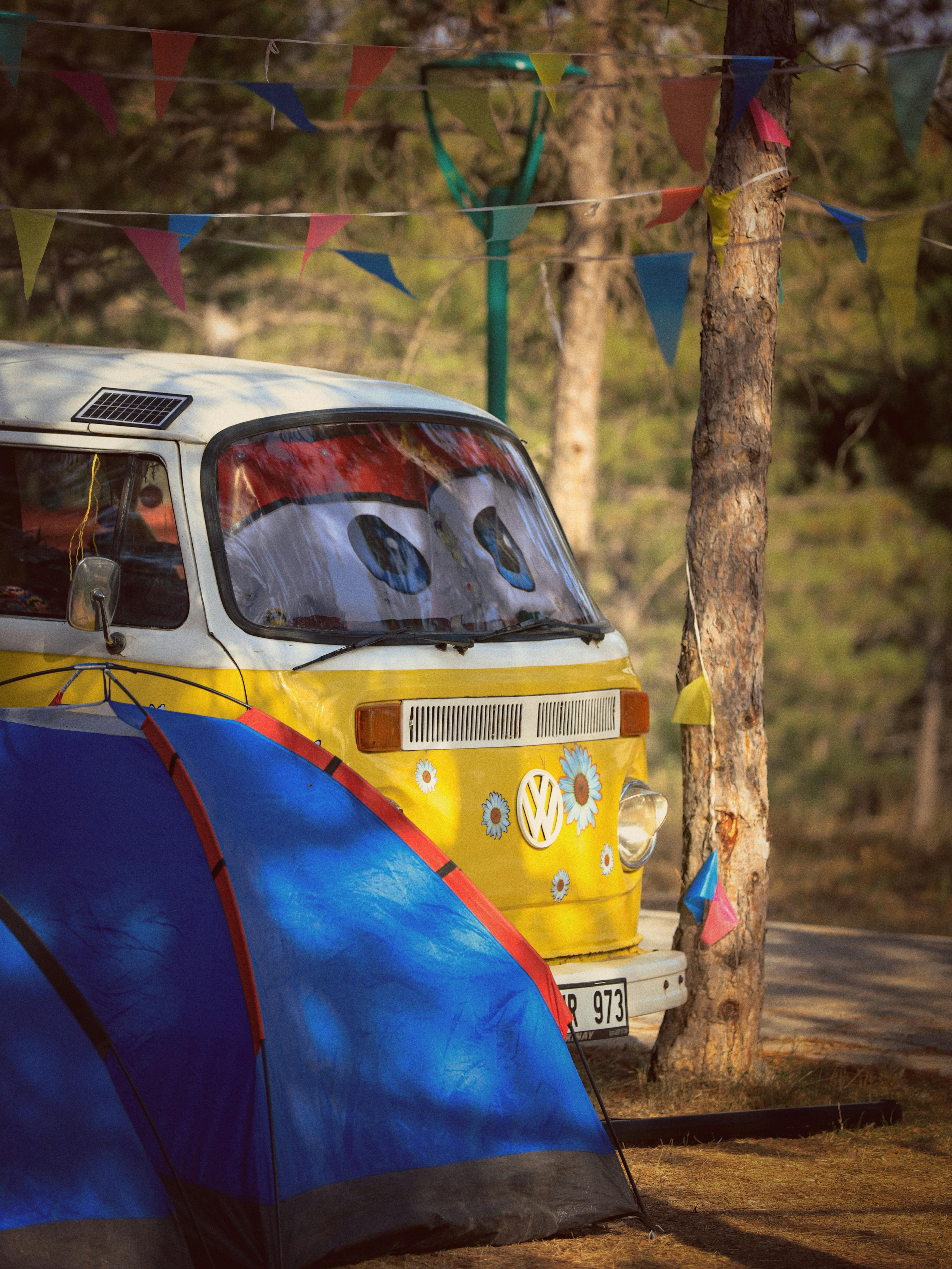 Yellow Camper Van in a Forest · Free Stock Photo