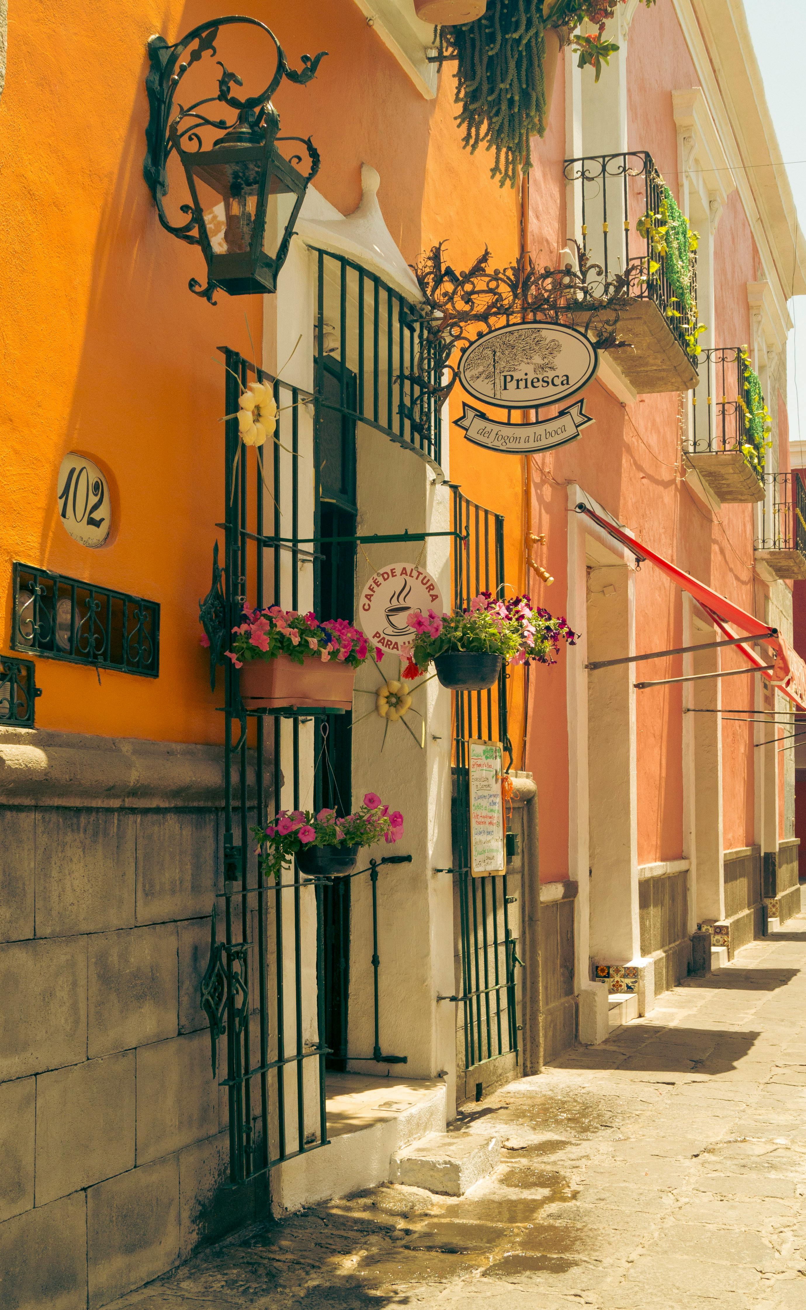 Cafe in a Yellow Tenement · Free Stock Photo