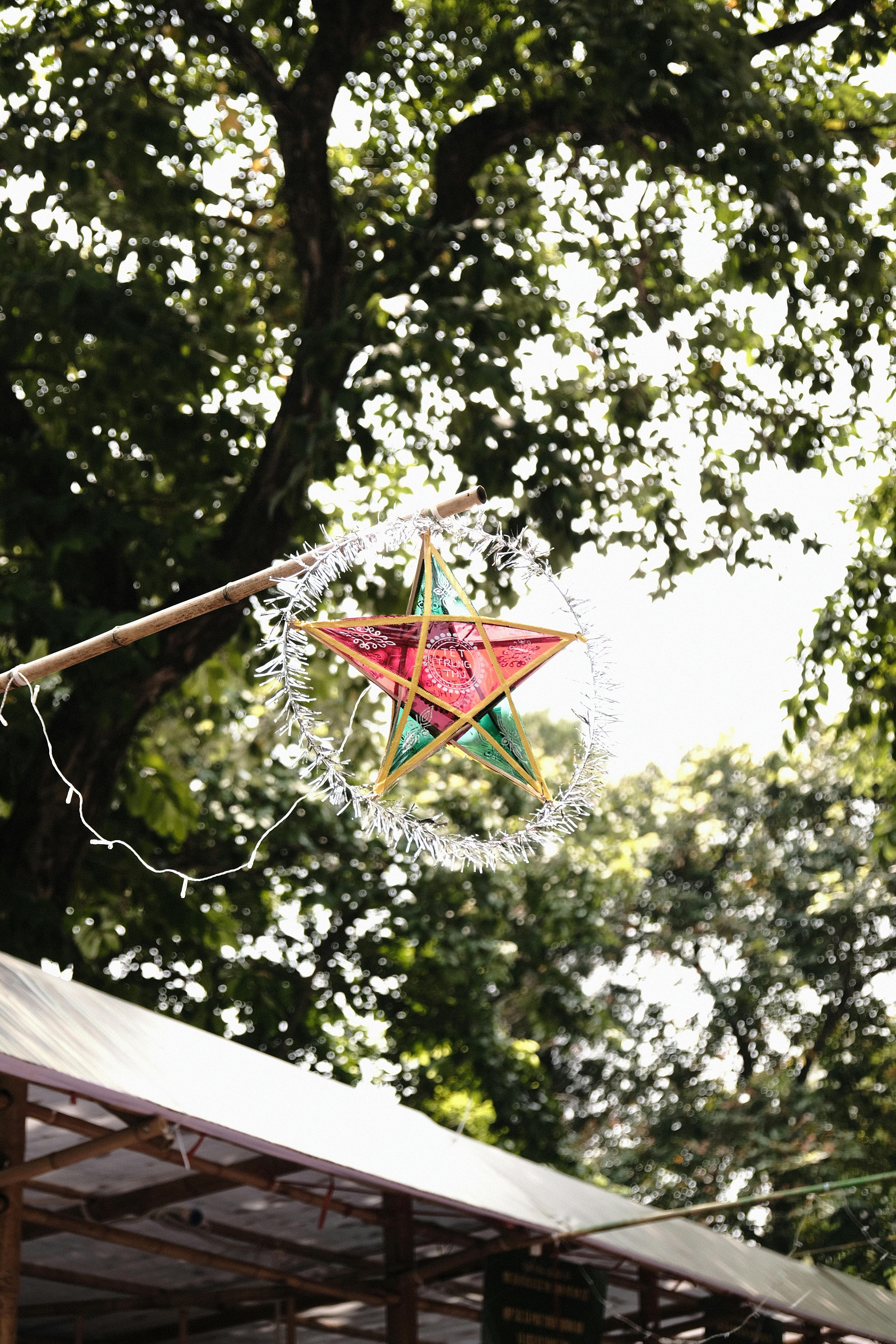 Star Shape Decoration on a Roof · Free Stock Photo