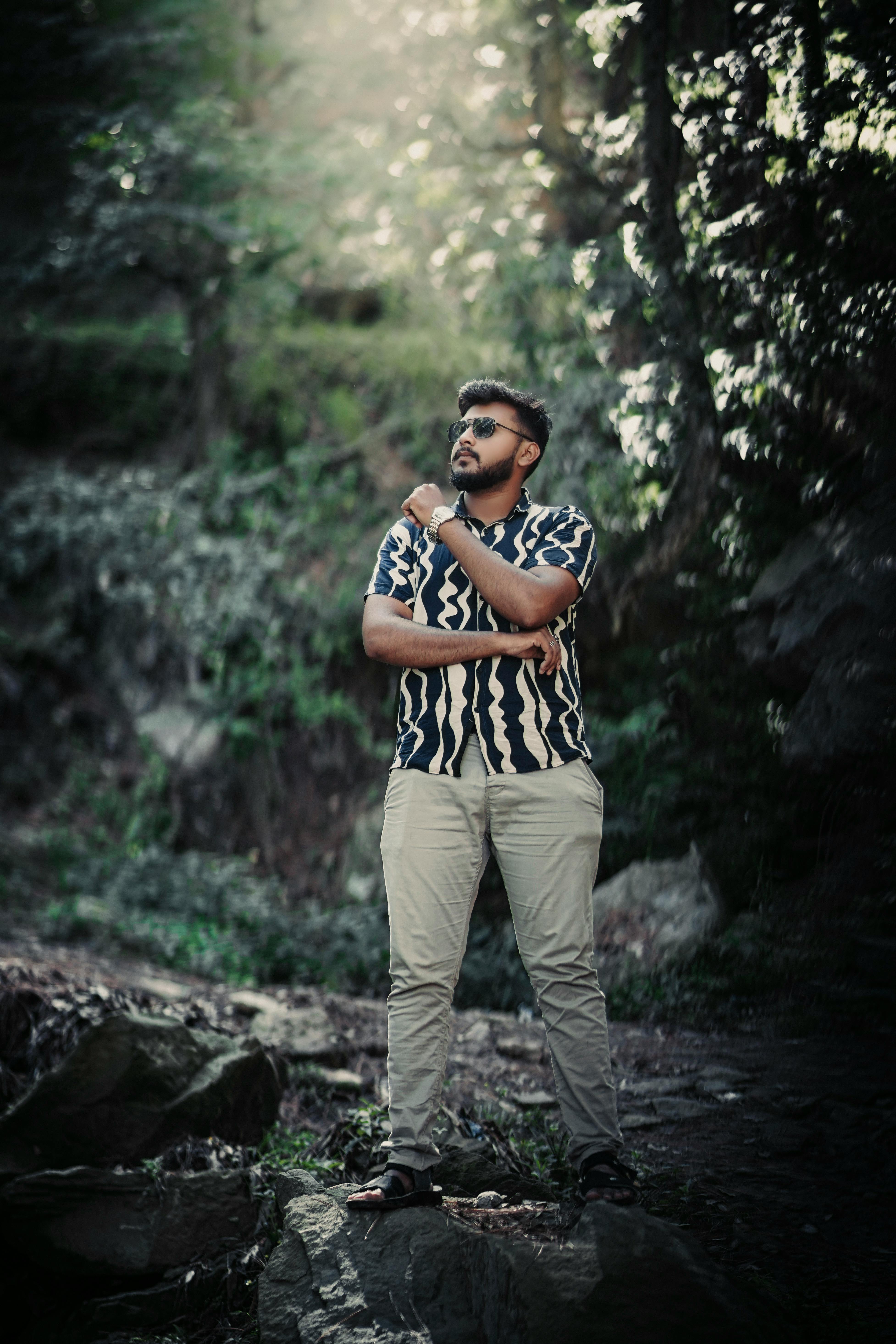 Man in Black Shirt, Pants, and Sandals Slumping in a Chair · Free Stock ...