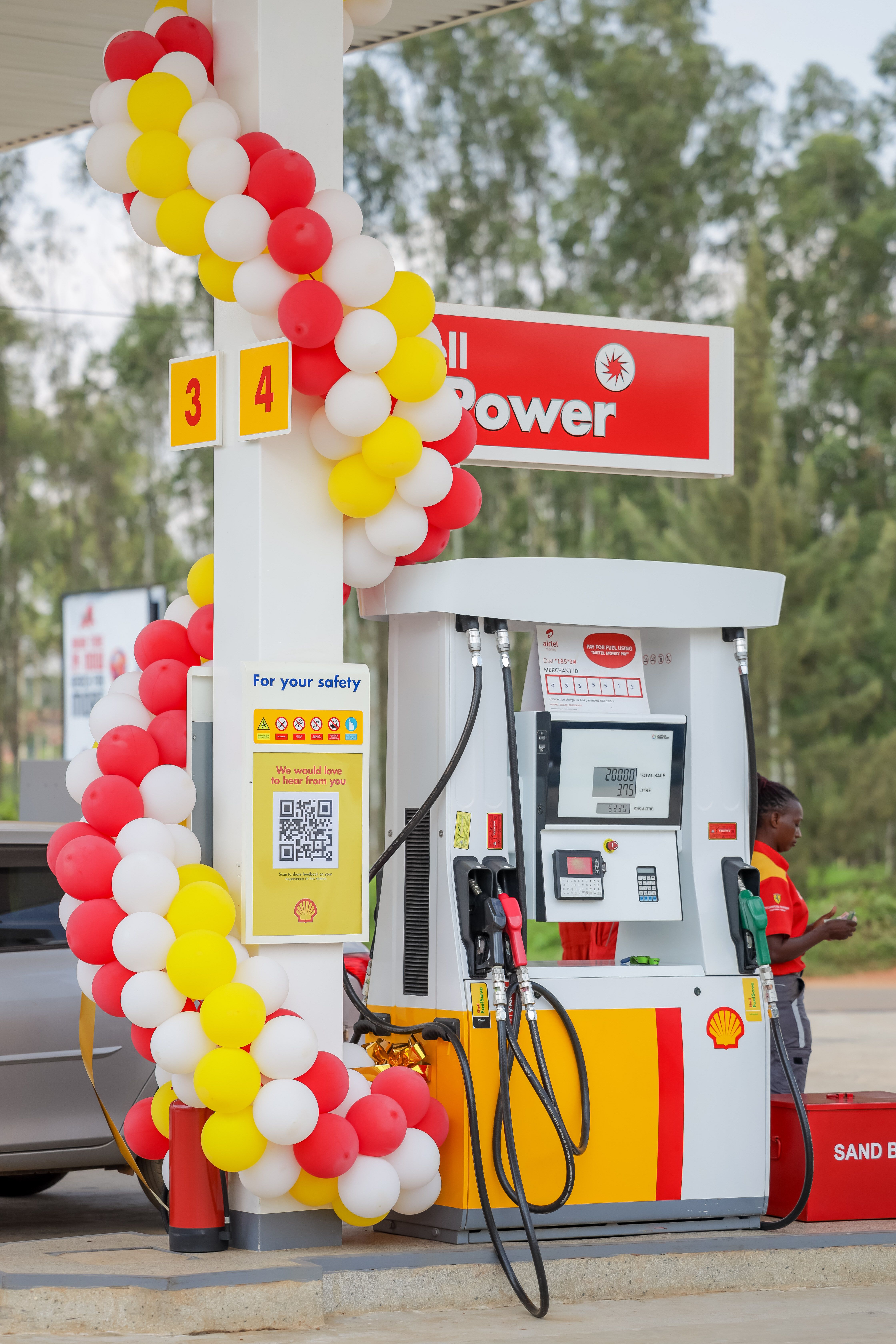Photo of Balloons on a Petrol Station · Free Stock Photo
