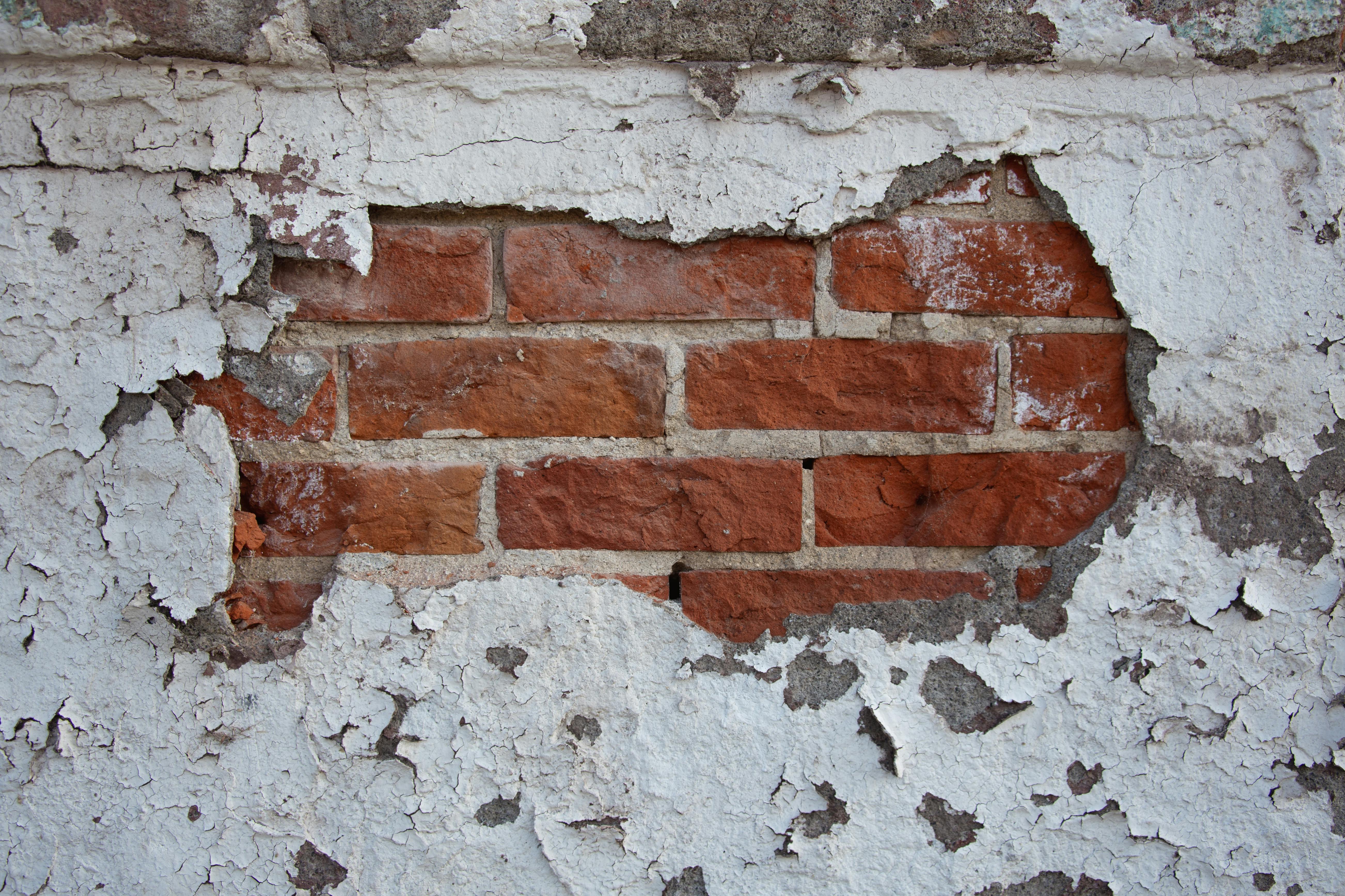 Cracked, White Wall with Bricks · Free Stock Photo