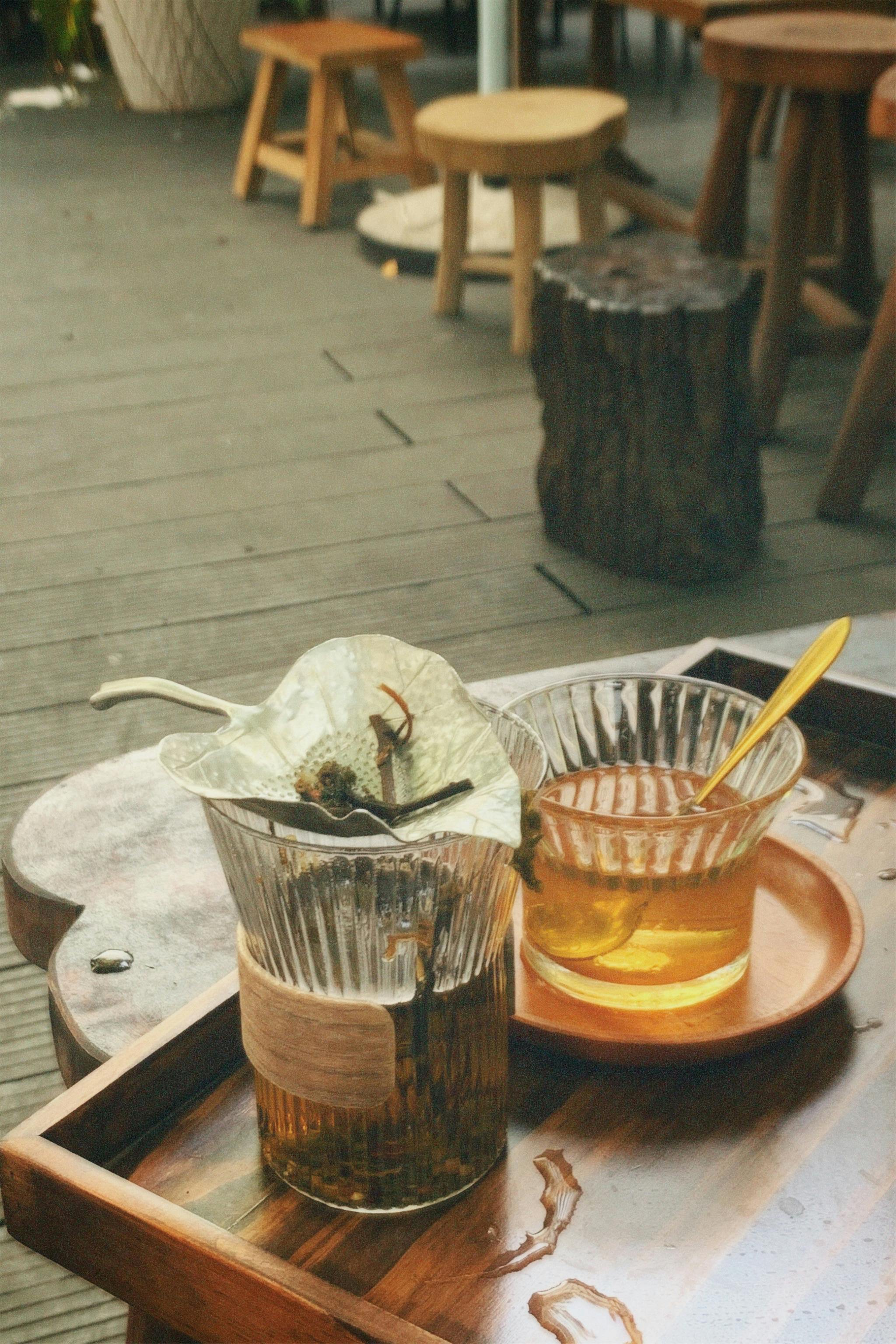 Filtering Tea Herbs in Cafe · Free Stock Photo
